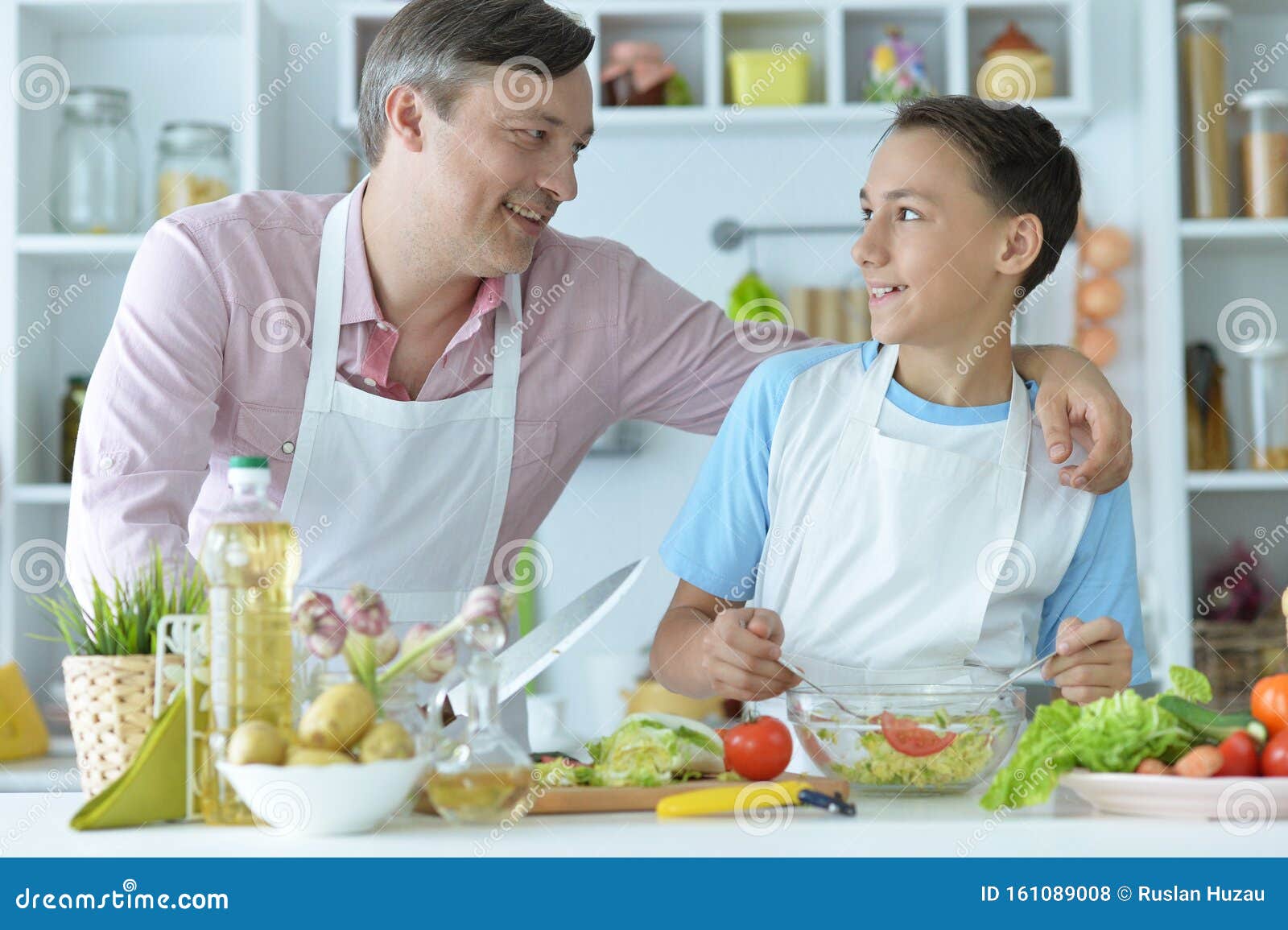 Close Up Portrait of Father and Son Cooking Stock Photo - Image of ...