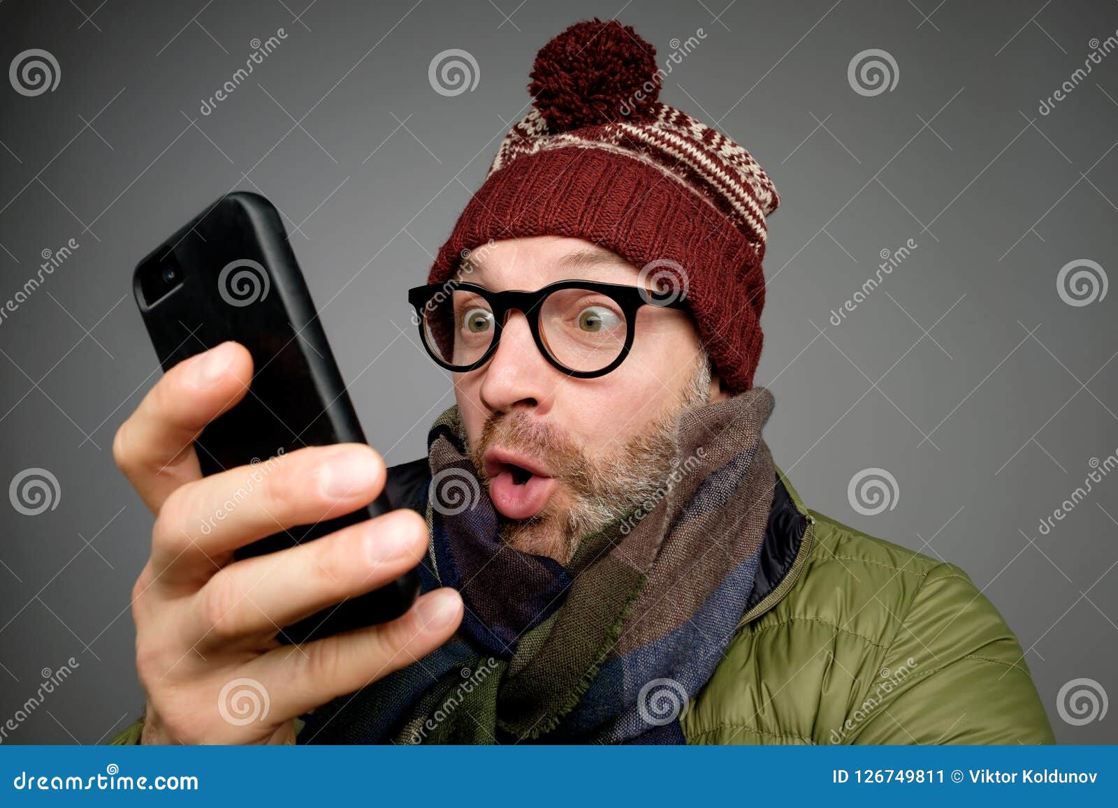 Close Up Portrait Of Funny Young Man Is Surprised And Shocked Confused