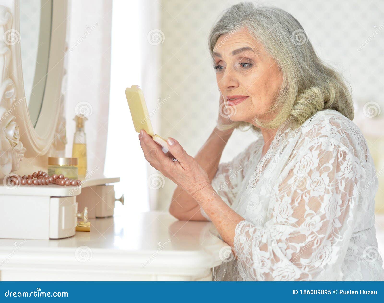 Close Up Portrait of Happy Senior Woman Sitting Near Dressing Table ... Close Up Portrait of Happy Senior Woman Sitting Near Dressing Table ...