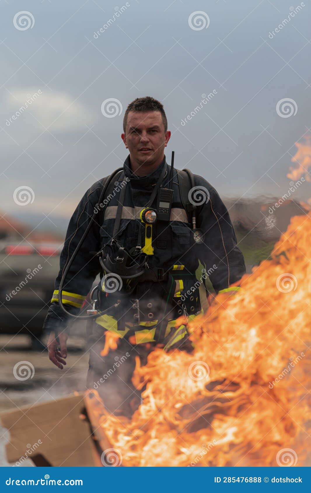 Close-up Portrait of a Heroic Fireman in a Protective Suit. Firefighter ...