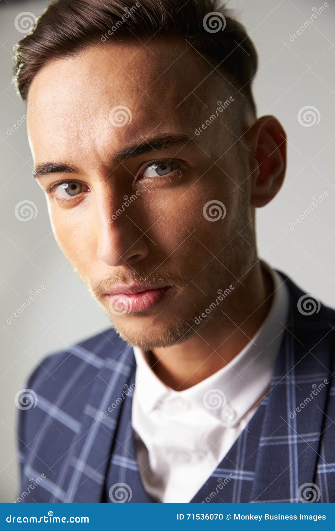 Close-up Portrait of Inquisitive Young Man Wearing a Suit Stock Photo ...