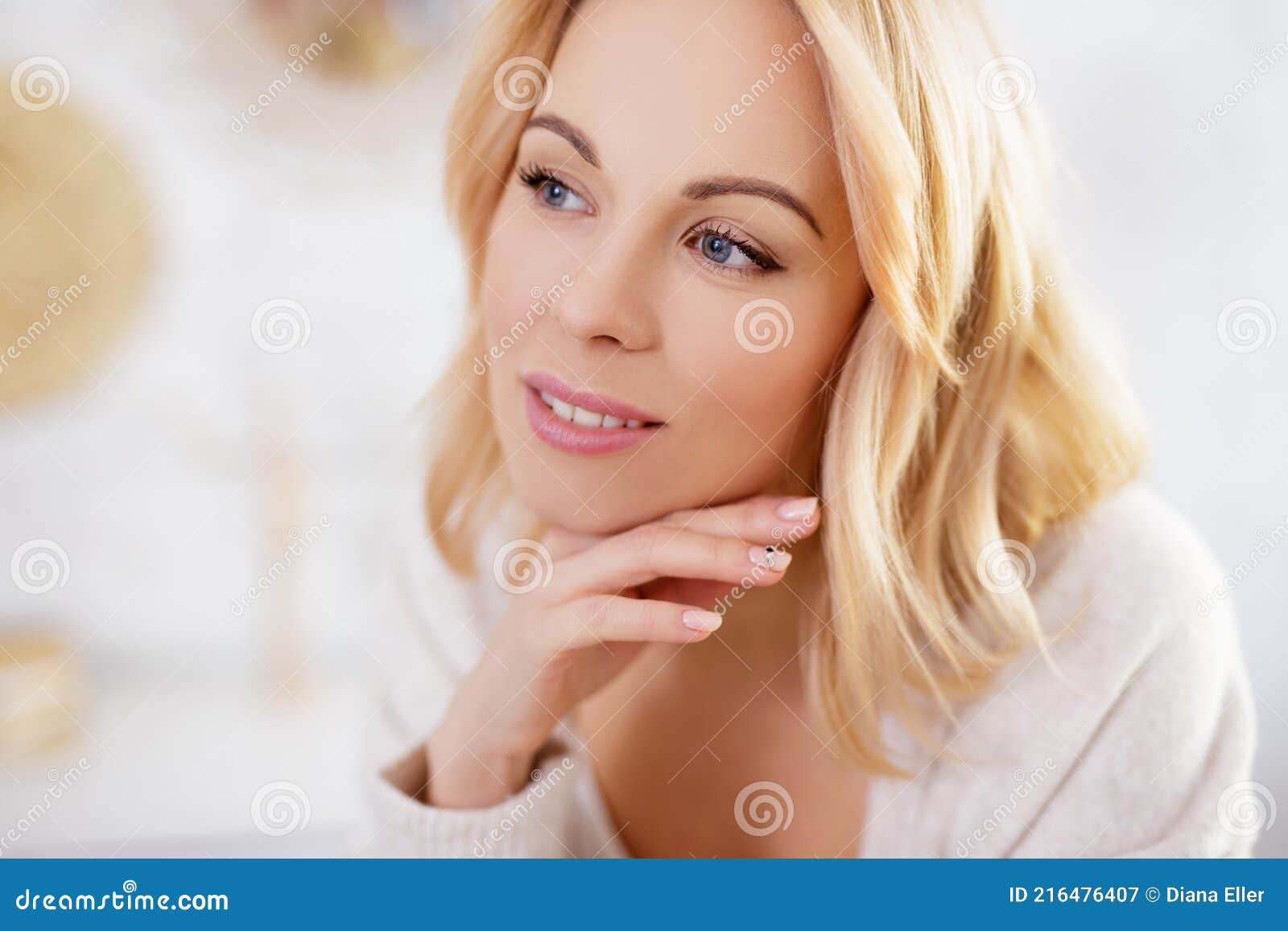 Close Up Portrait Of Pretty Blond Woman In Bright Room Stock Image