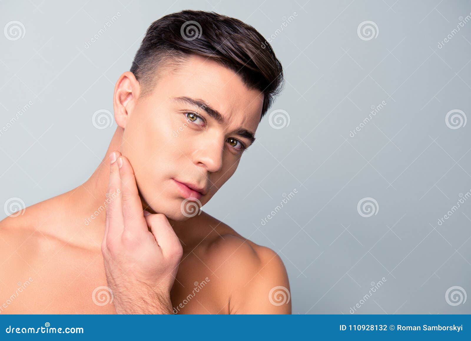 Close Up Portrait Of Satisfied Confident Handsome Guy Touching W Stock