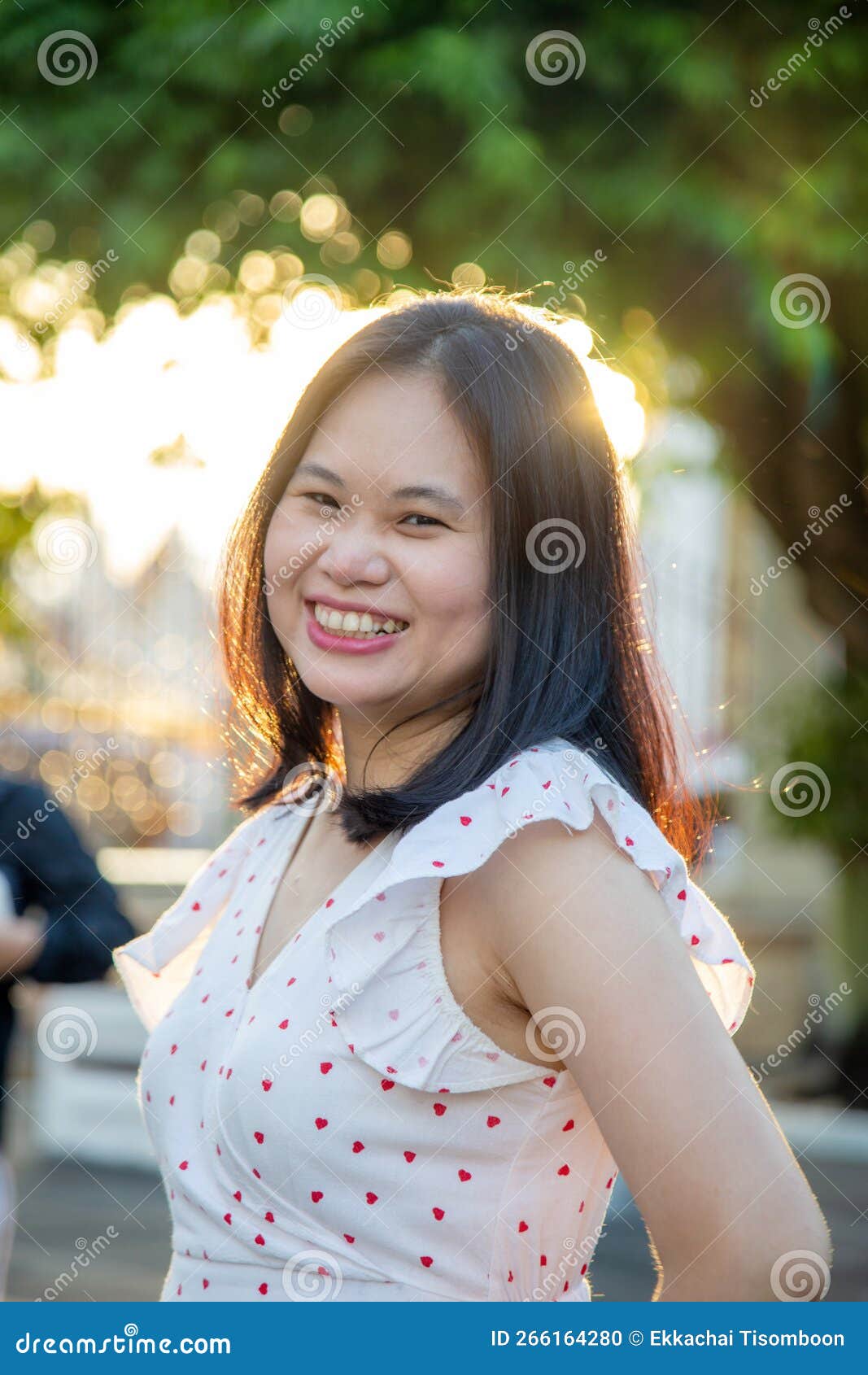 Close Up Portrait Smiling Asian Woman in a White Dress, she is Looking ... Close Up Portrait Smiling Asian Woman in a White Dress, she is Looking ...