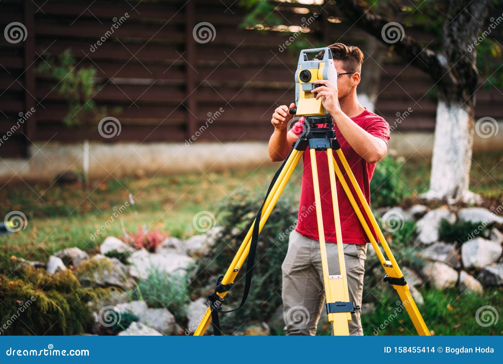 Portrait of Survey Engineer Using and Working with Total Station ...