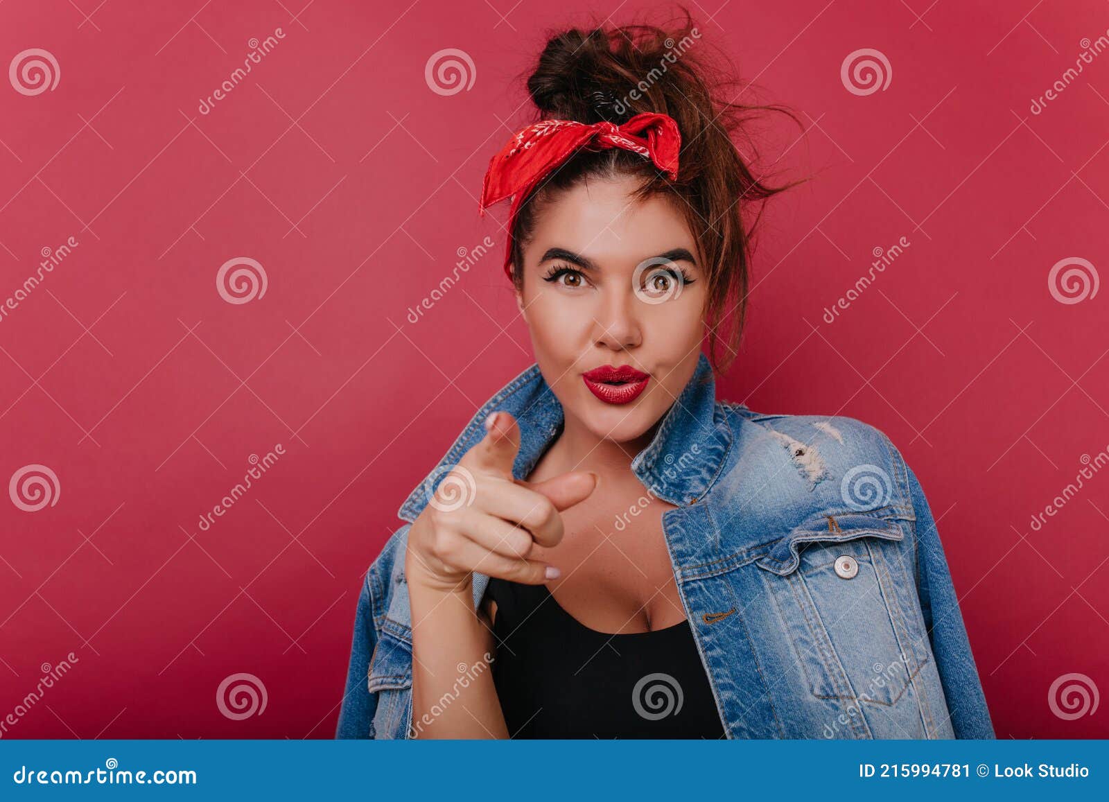 Close Up Portrait Of Winsome Dark Haired Girl With Bright Makeup And
