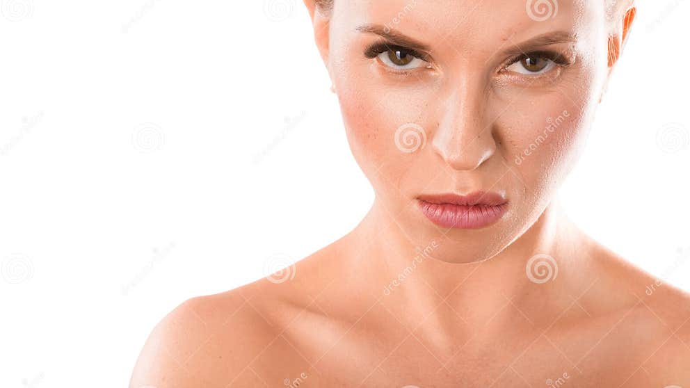Close Up Portrait Of A Woman With An Angry Face Isolated On White