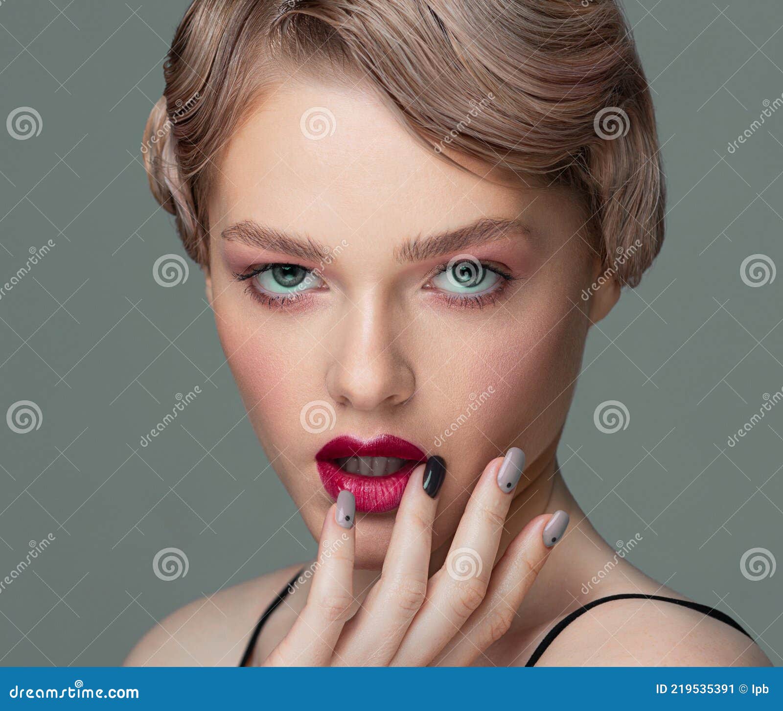 Close Up Portrait Of A Woman The Fingers Touch The Lips Stock Image