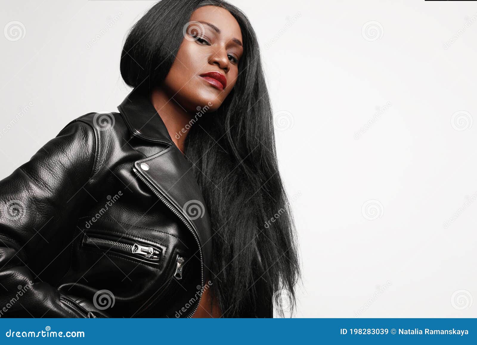 Close Up Portrait Of Young Attractive Black Woman Wearing A Leather