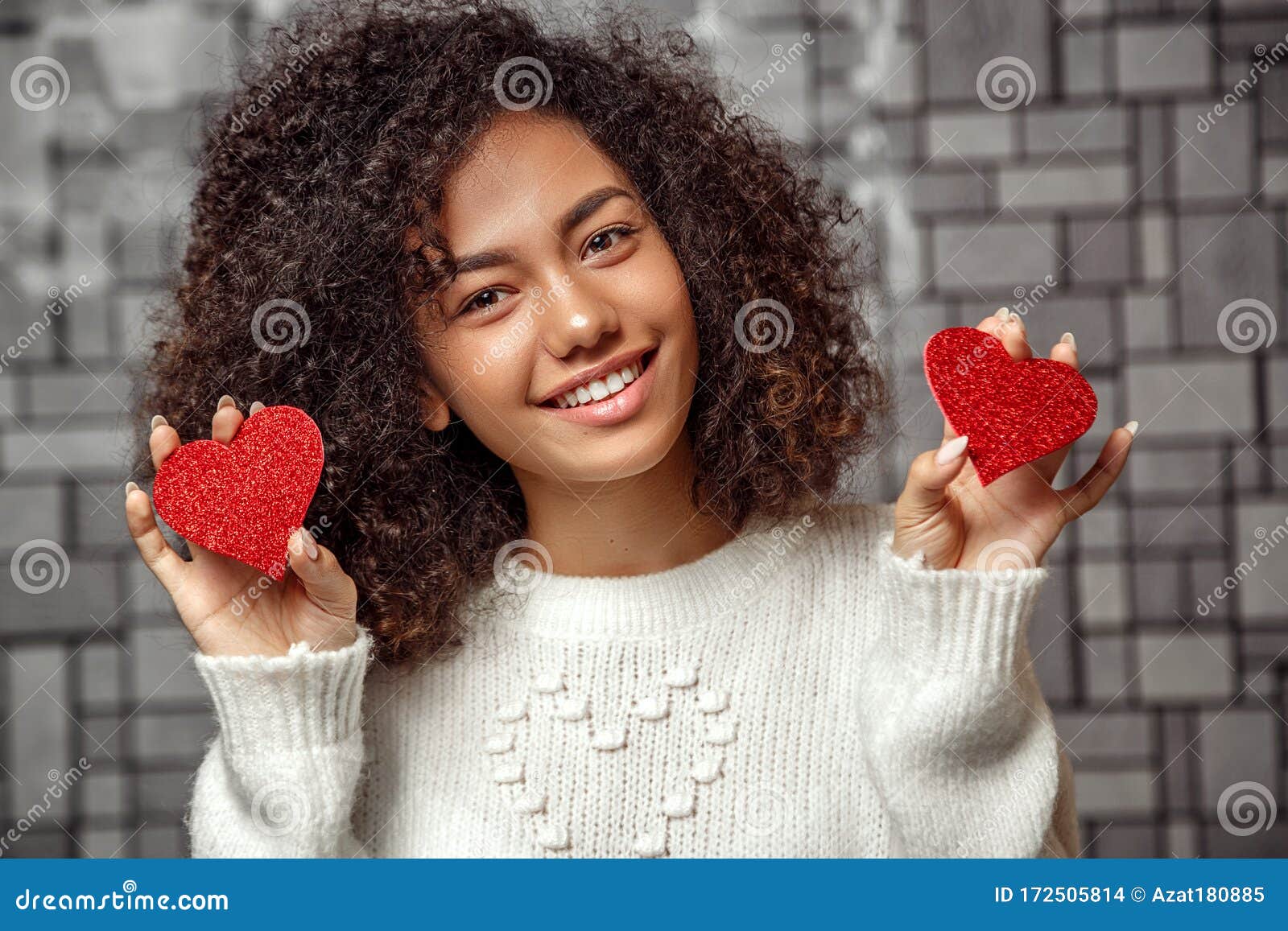 Close Up Portrait Of A Young Curly Haired African American Girl In A
