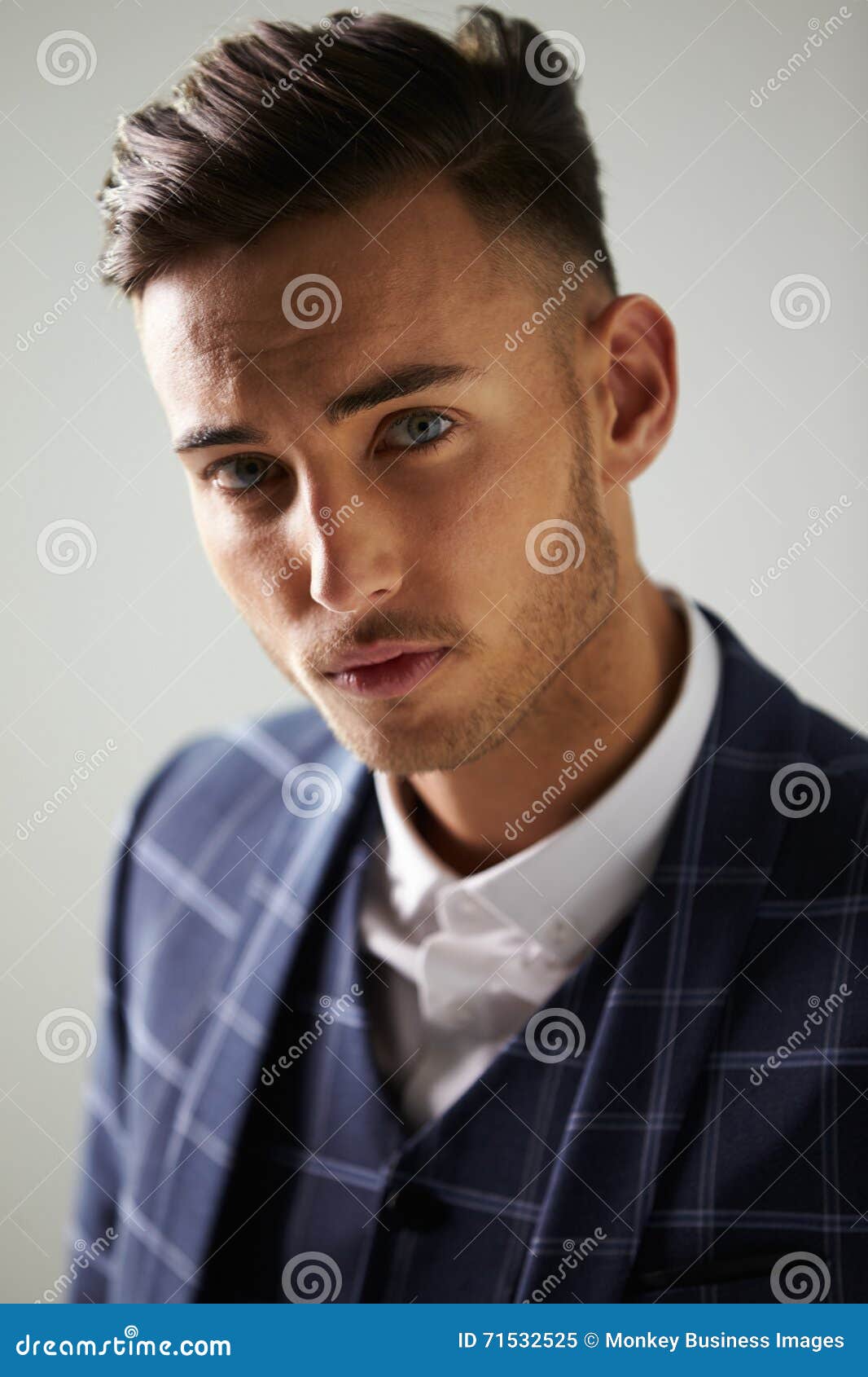 Close-up Portrait of Young Man Wearing Suit, Face in Shadow Stock Image ...