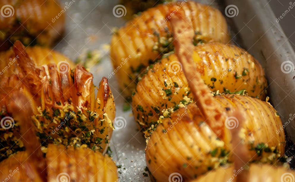Close up of potato bite stock photo. Image of potatoes - 272612820