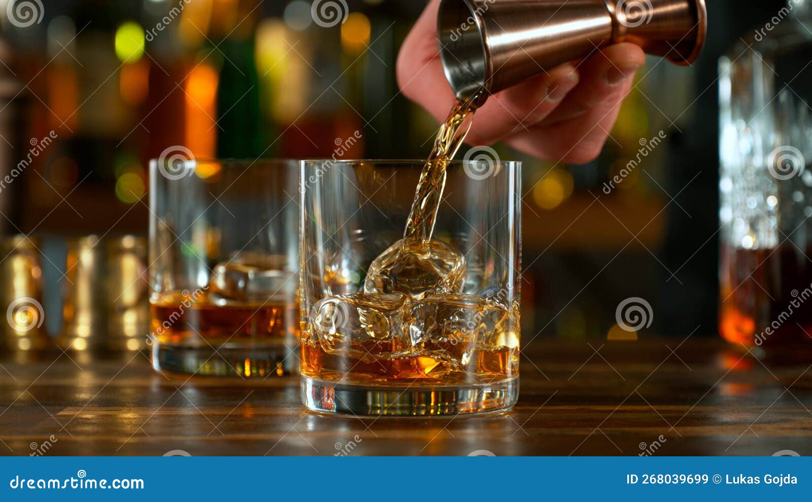 Close-up of Pouring Whiskey or Rum Stock Image - Image of bokeh ...
