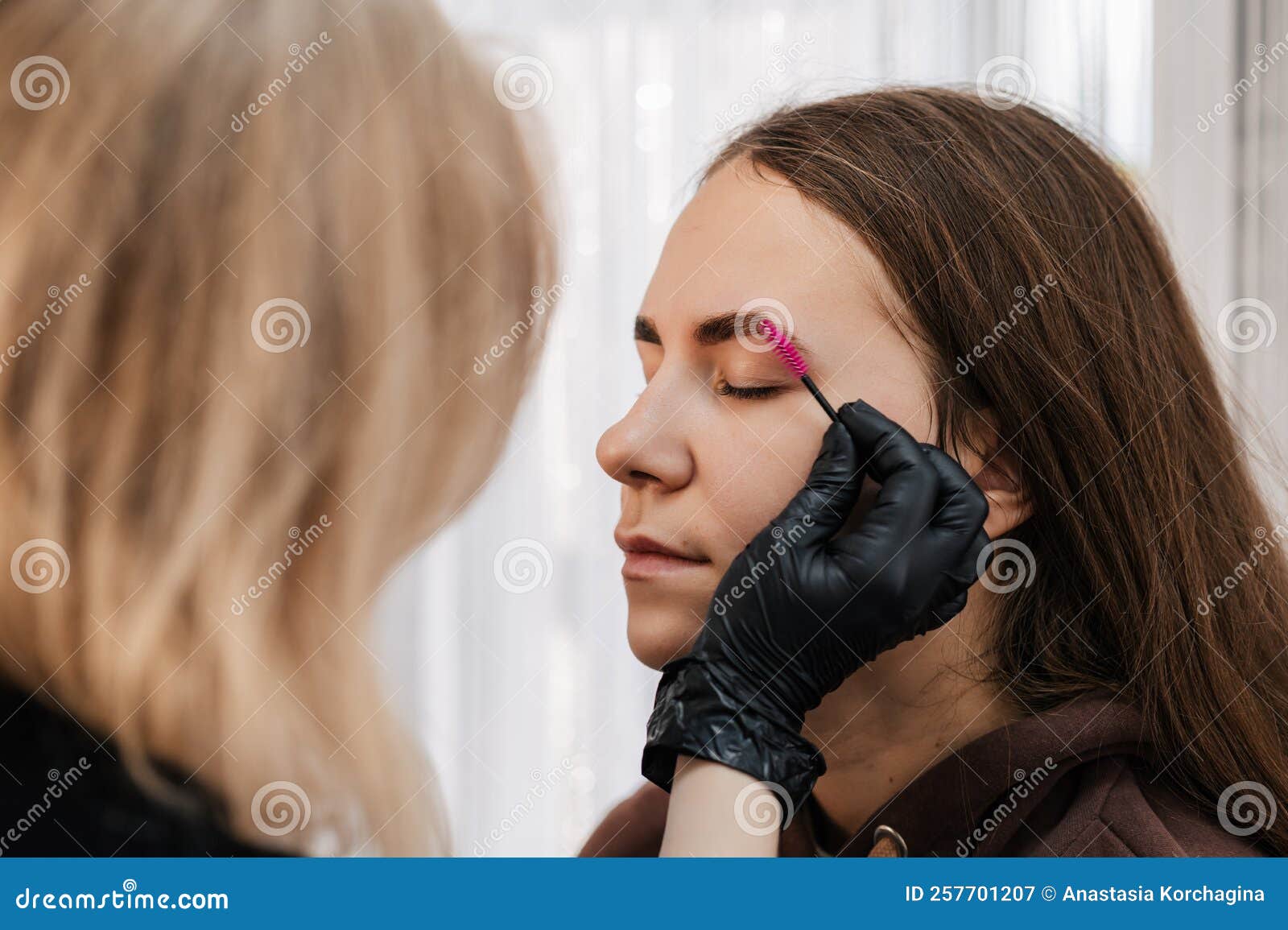 Close-up, the Procedure of Combing the Hairs on the Eyebrows in a ...