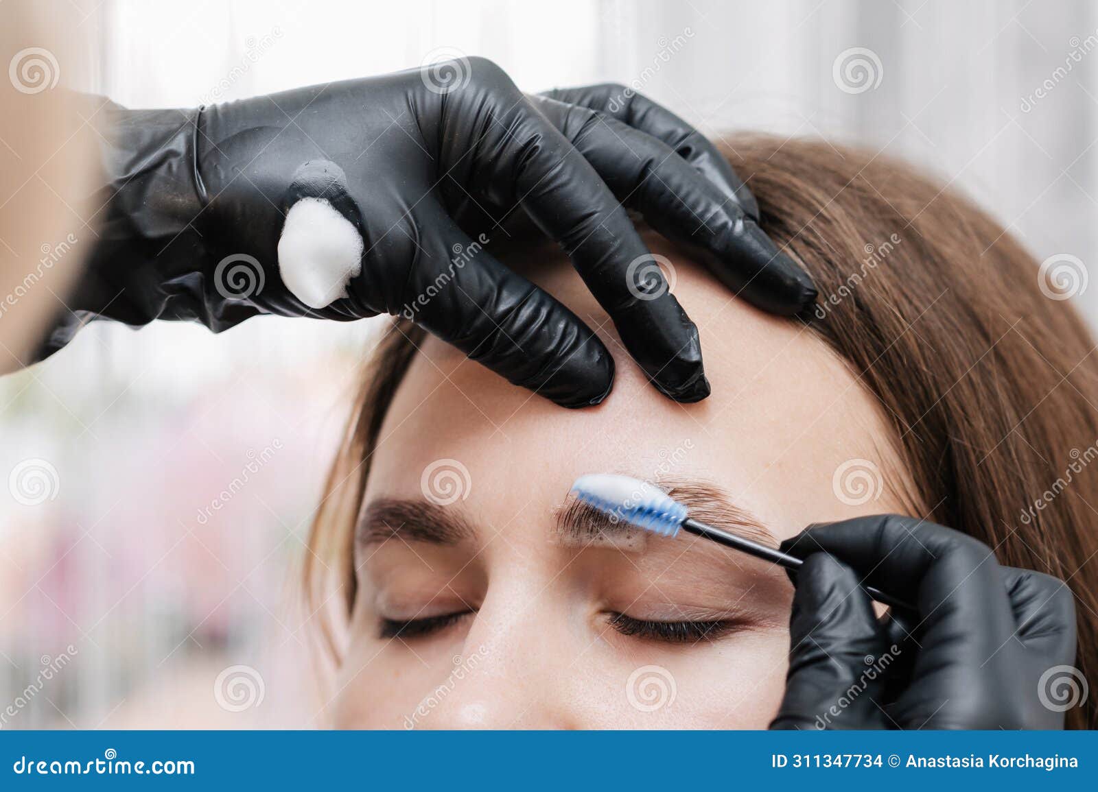 Close-up, the Procedure of Combing the Hairs on the Eyebrows in a ...