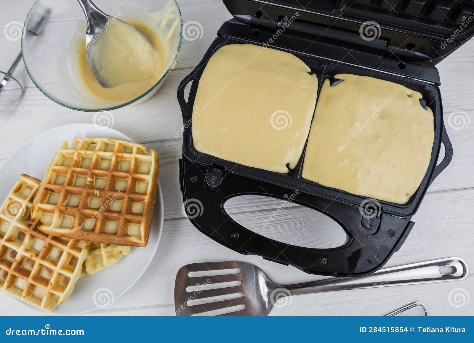 Close-up of the Process of Making Belgian Waffles in a Waffle Iron at ...