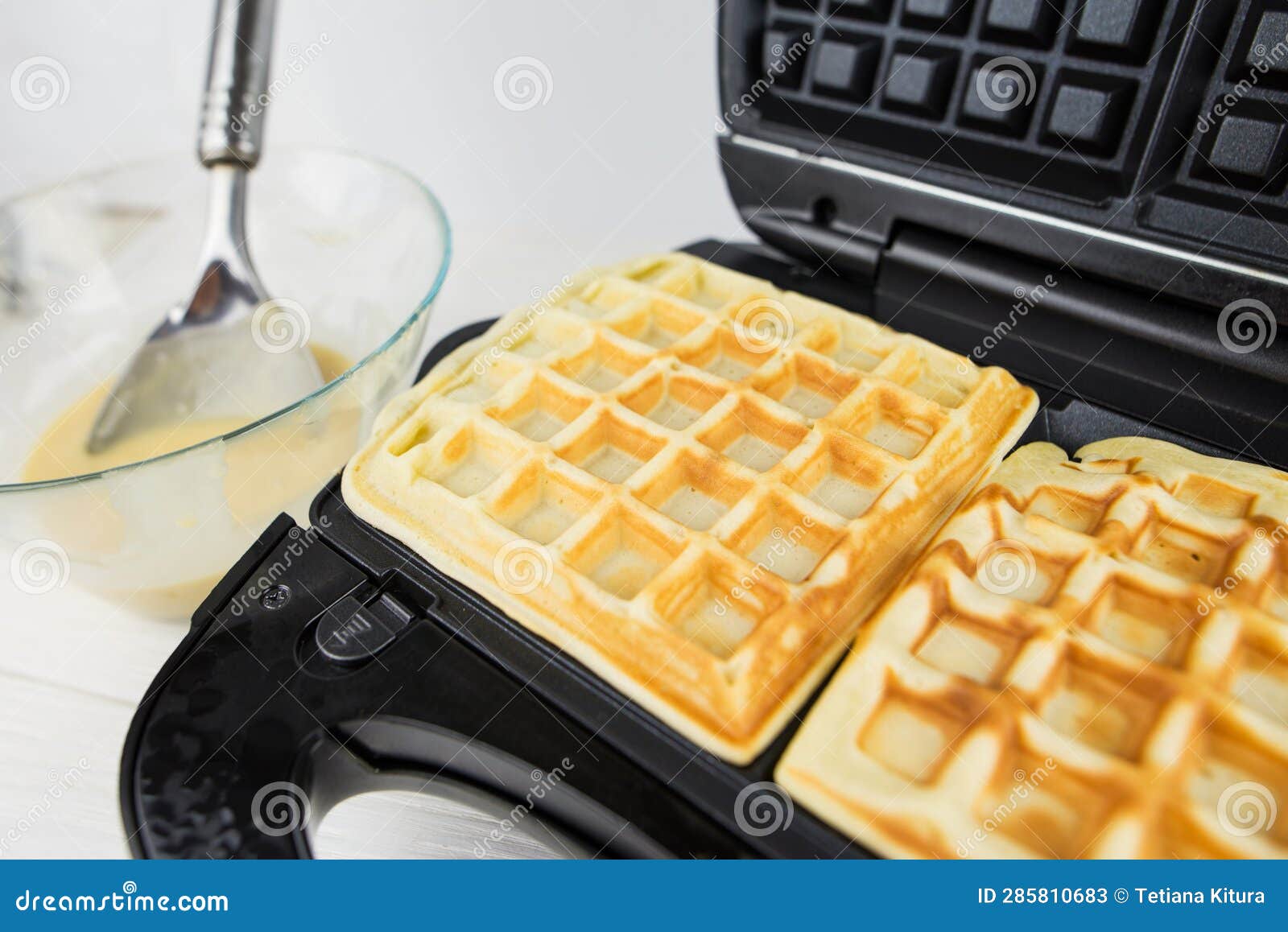 Close-up of the Process of Making Belgian Waffles in a Waffle Iron at ...