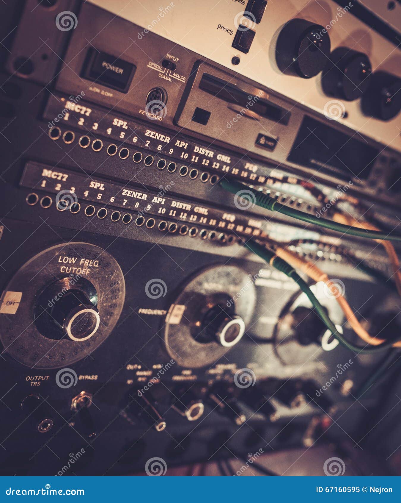 Close-up Professional Audio Equipment with Sliders and Knobs at ...