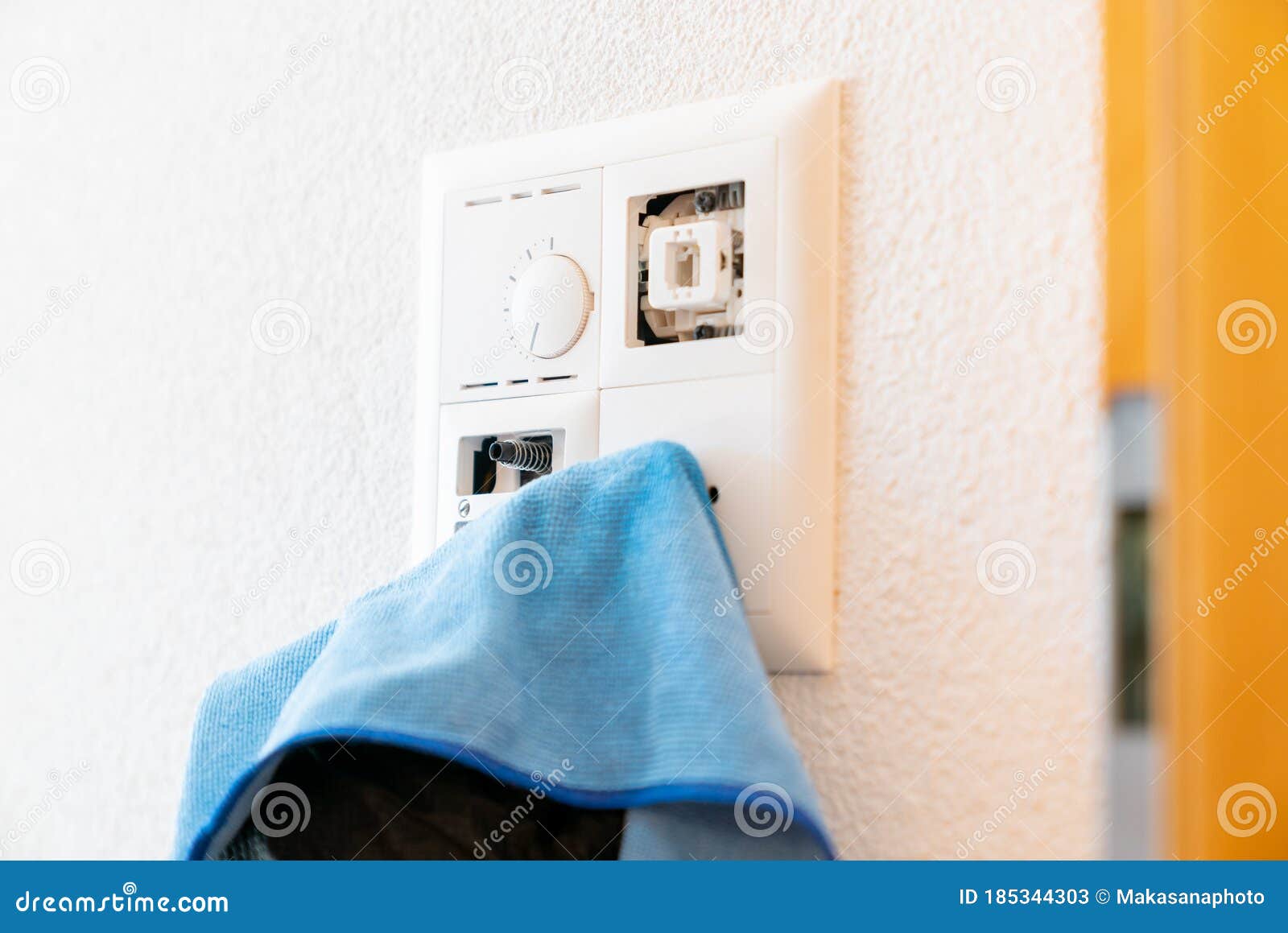 Close Up of a Professional Cleaner Cleaning a Modern Light Switch and ...