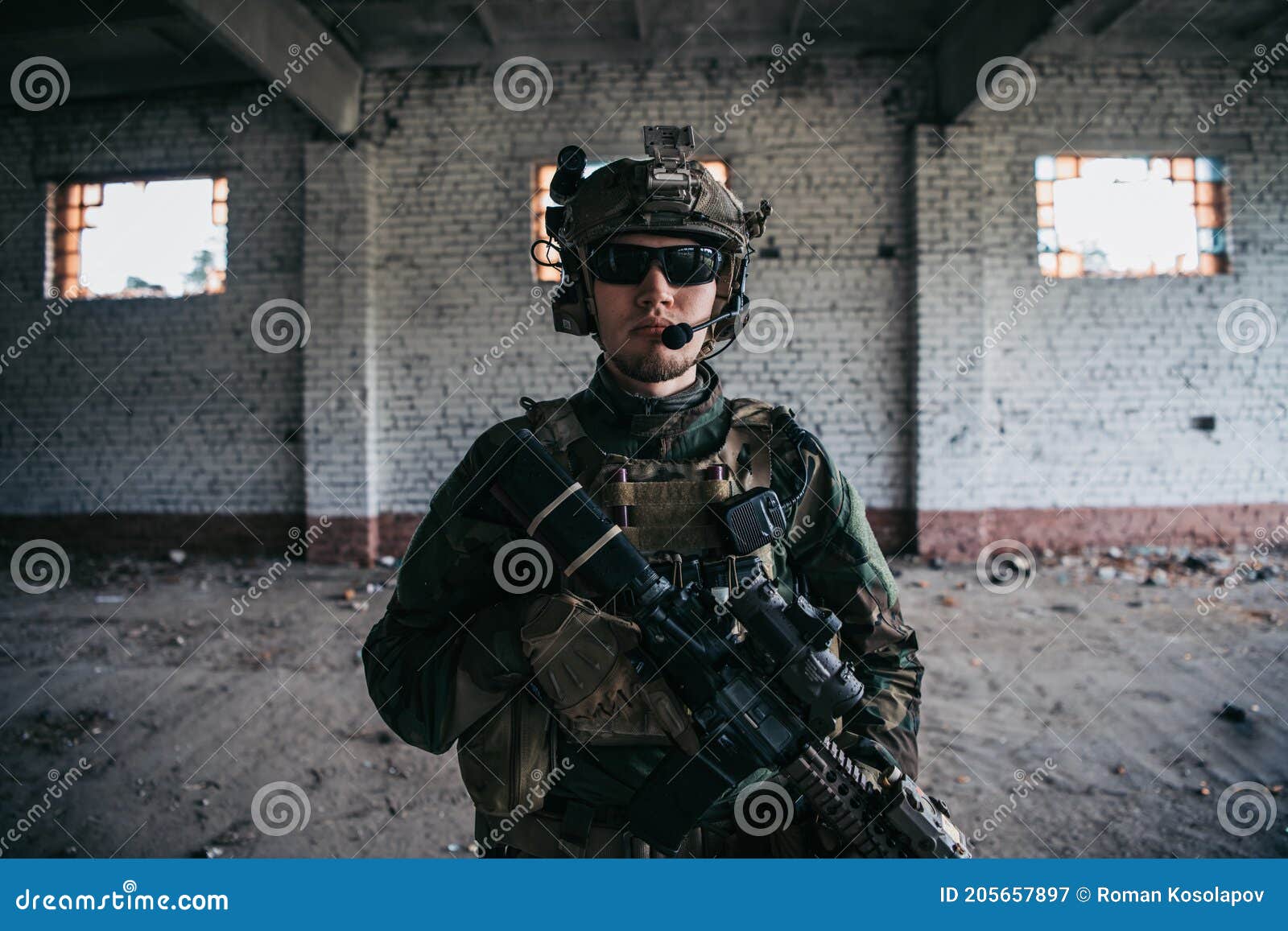 Close-up of a Professional Fully Equipped Soldier Looking at Camera ...