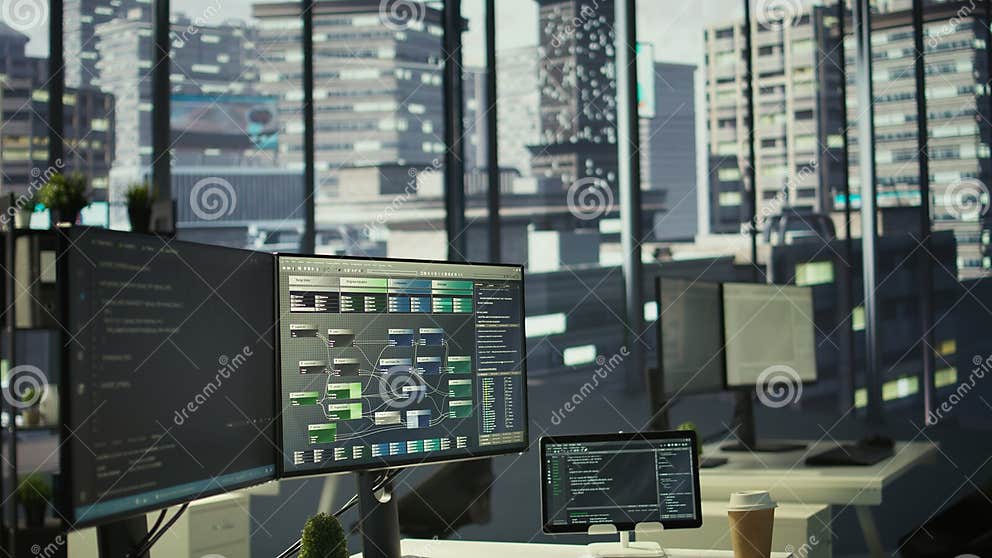 Close Up of Programming Code on Computer Monitors in Company Workspace ...