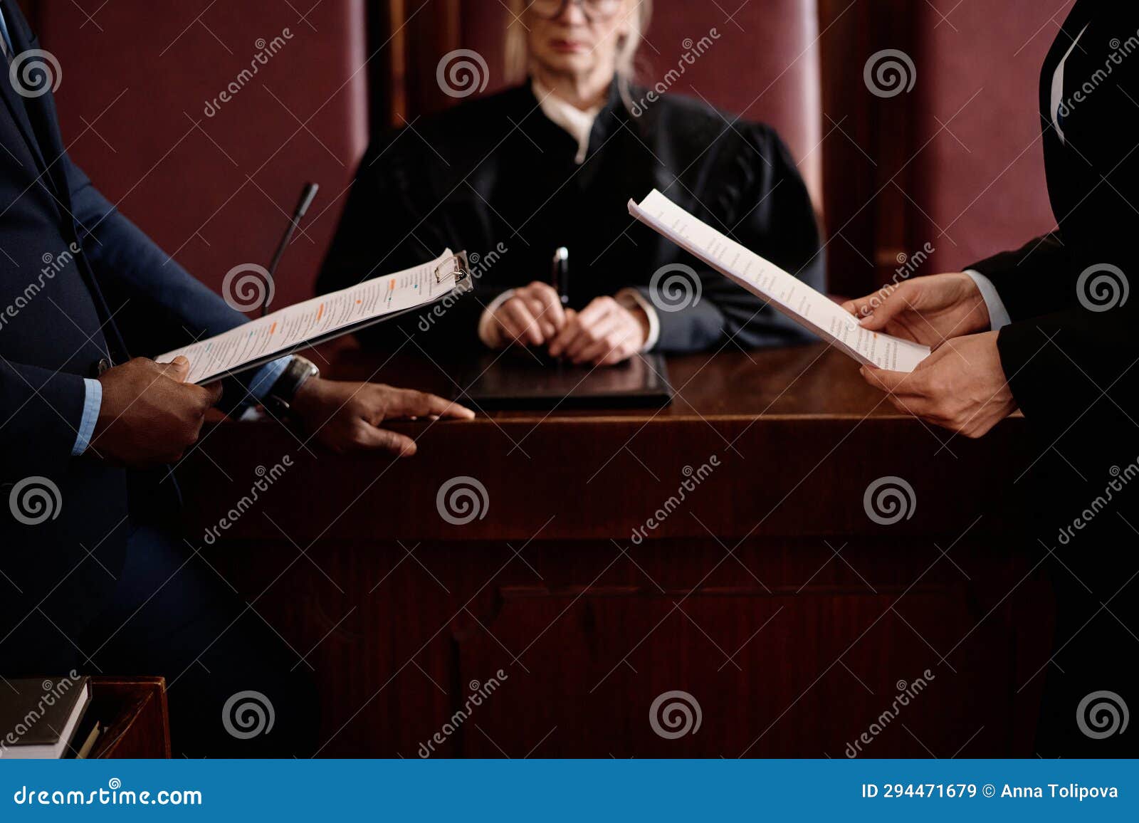 Close Up Of Prosecution And Defense Sides Holding Juridical Documents