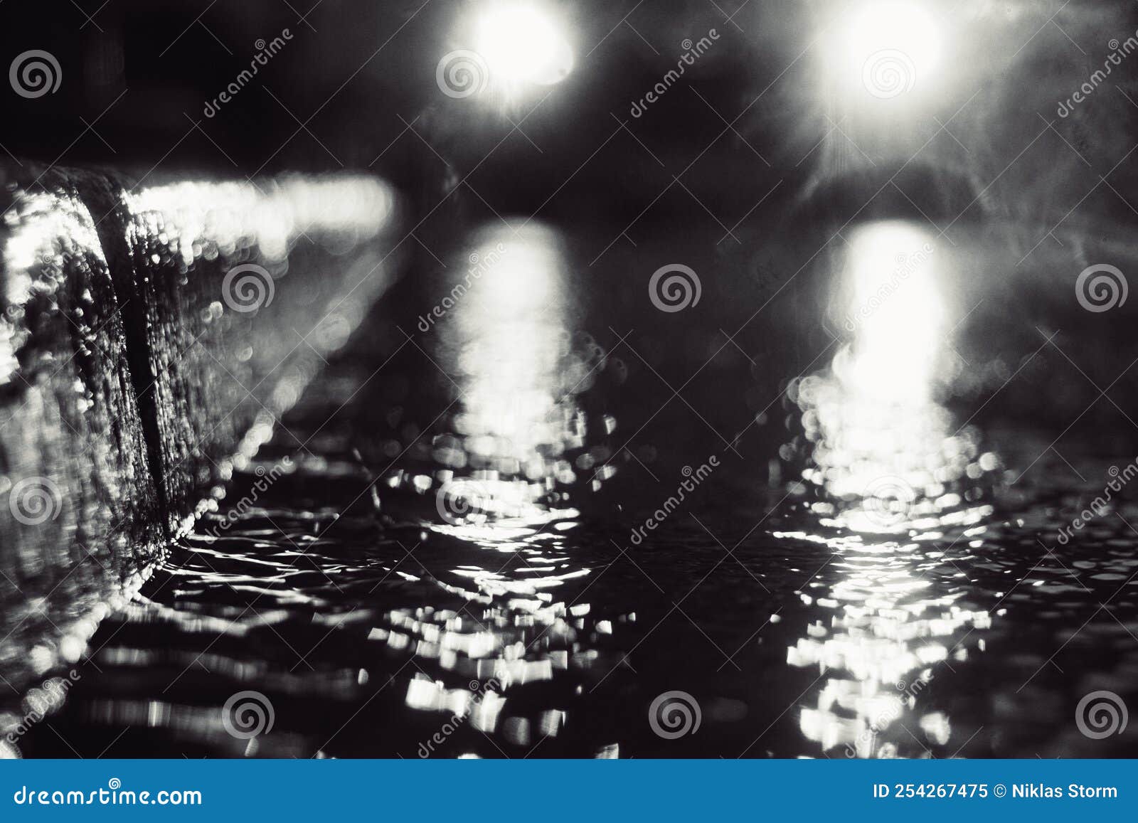 Close-up of Puddle on Road at Night Stock Image - Image of close, night ...