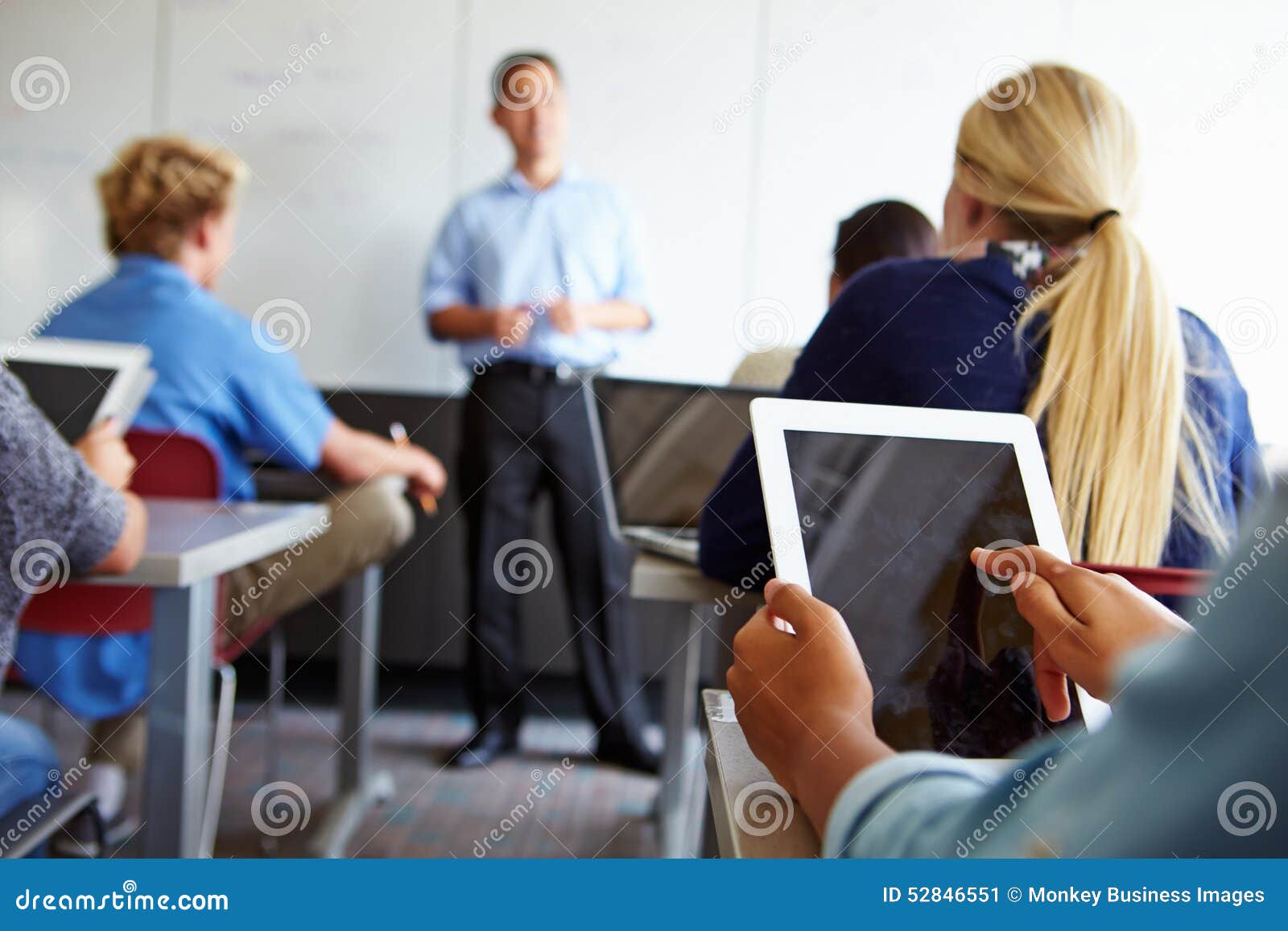 Close Up of Pupil Using Digital Tablet in Classroom Stock Image - Image ...