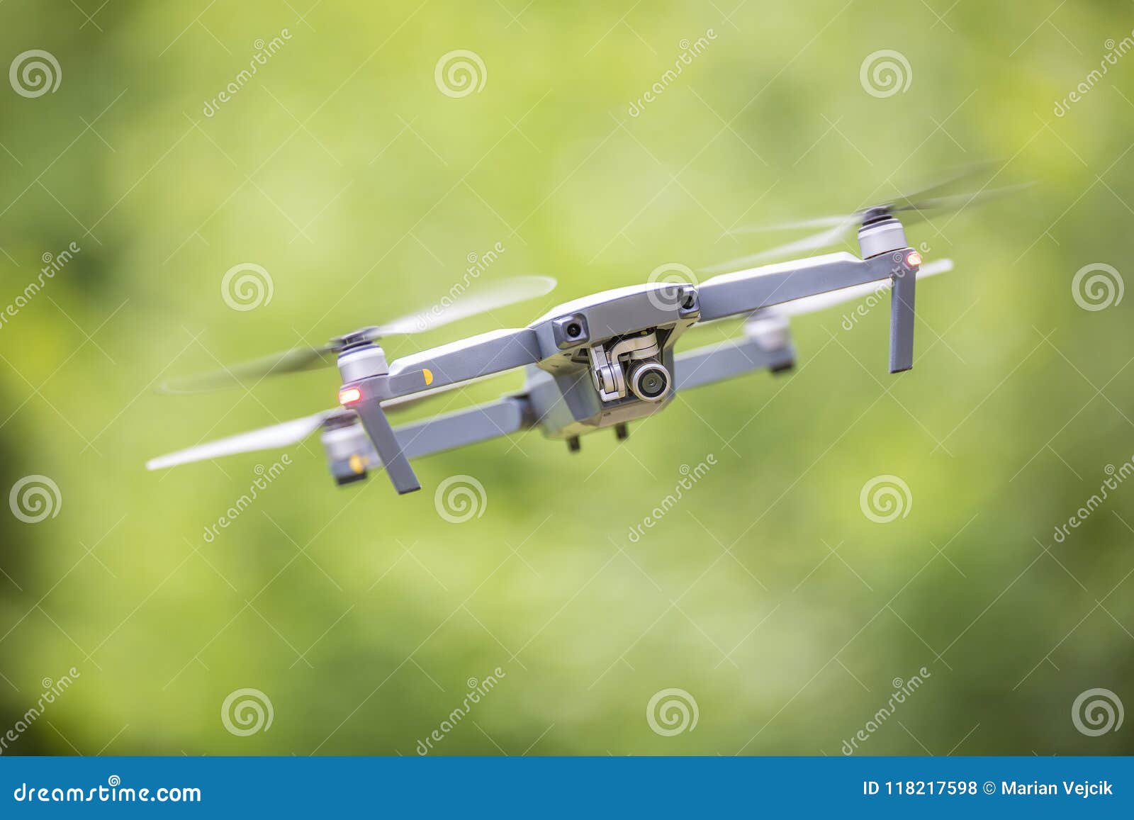 Close-up Quadcopter Drone with Camera Flying in Park Stock Photo ...