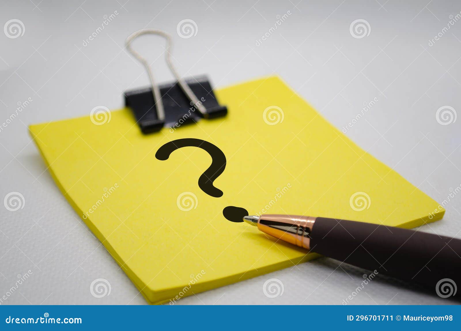 Close Up of Question Mark on Notepad with Pen on White Background ...