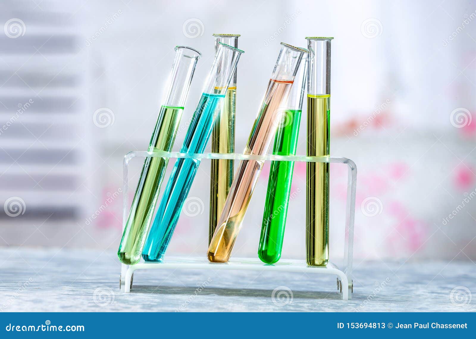 Close Up Rack of Test Tubes, Slightly Leaning Folded of Colored Liquid ...