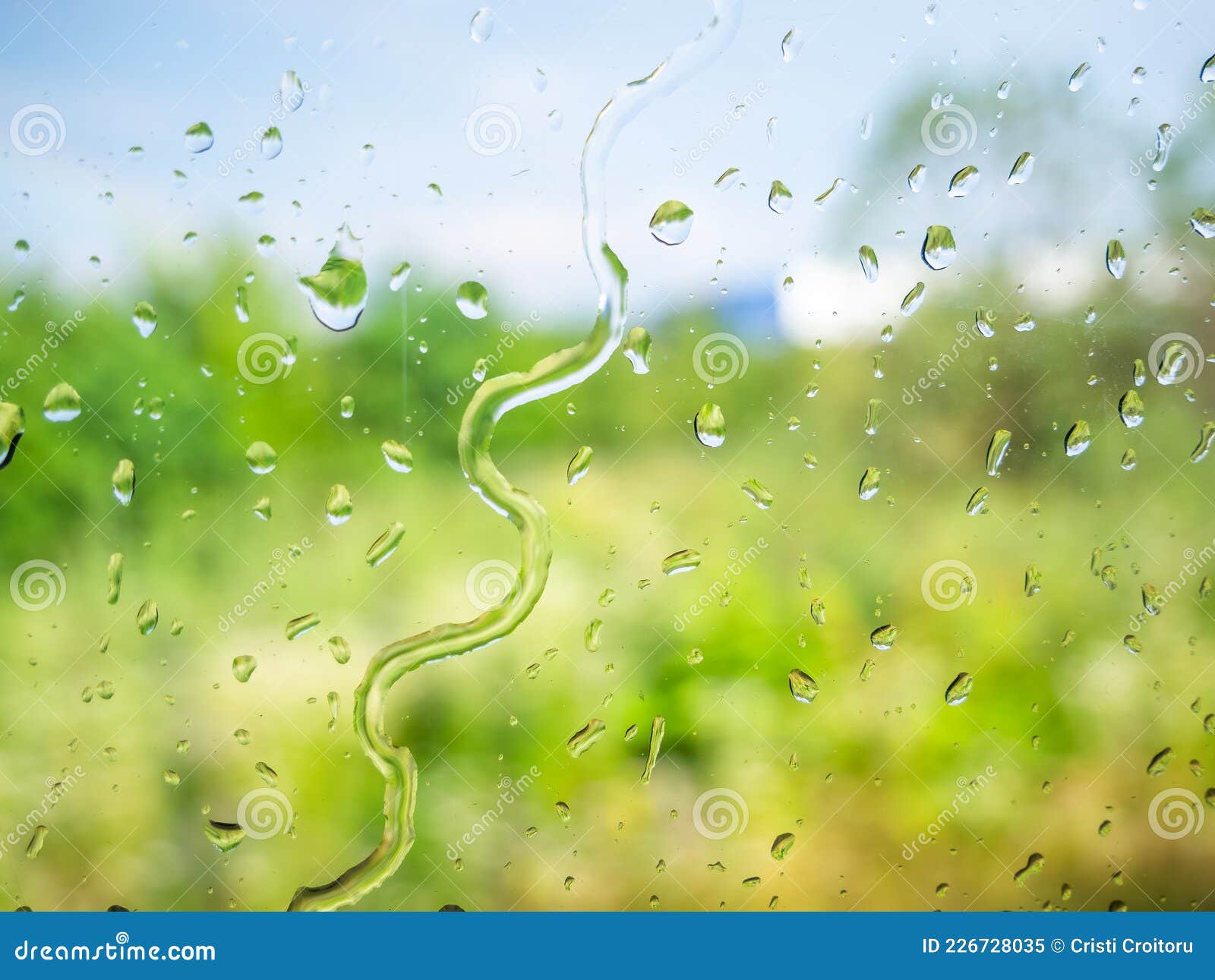 Close Up with Rain Drops or Water Drops on the Glass Window. Draining ...