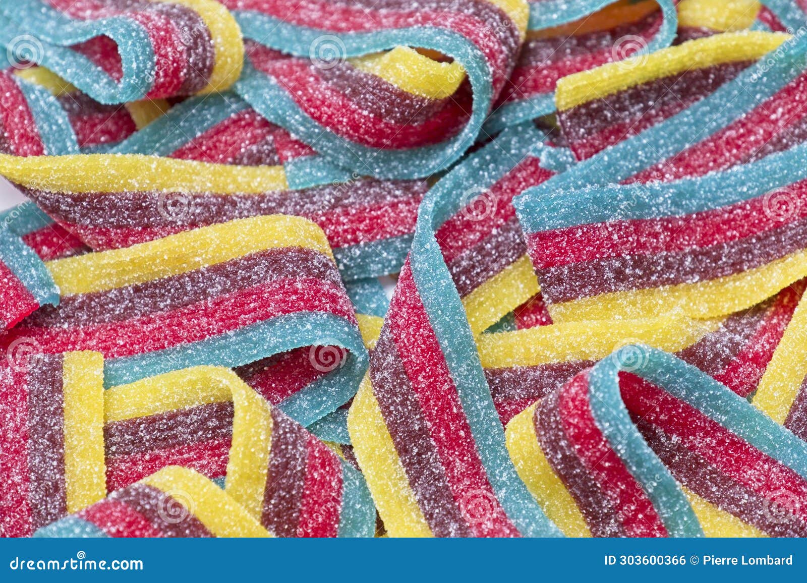 Close Up of Rainbow Colored Sugar Coated Candy Strips Stock Photo ...