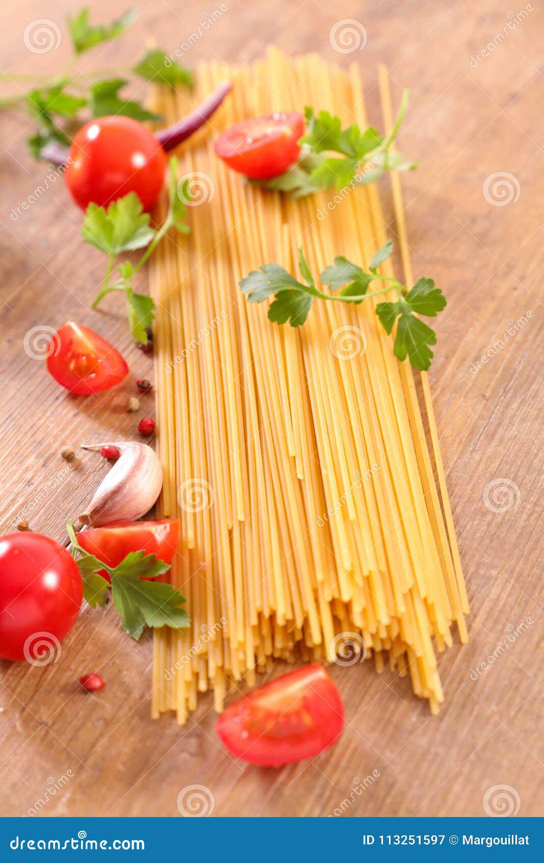 Raw spaghetti stock image. Image of seasoning, spaghetti - 113251597