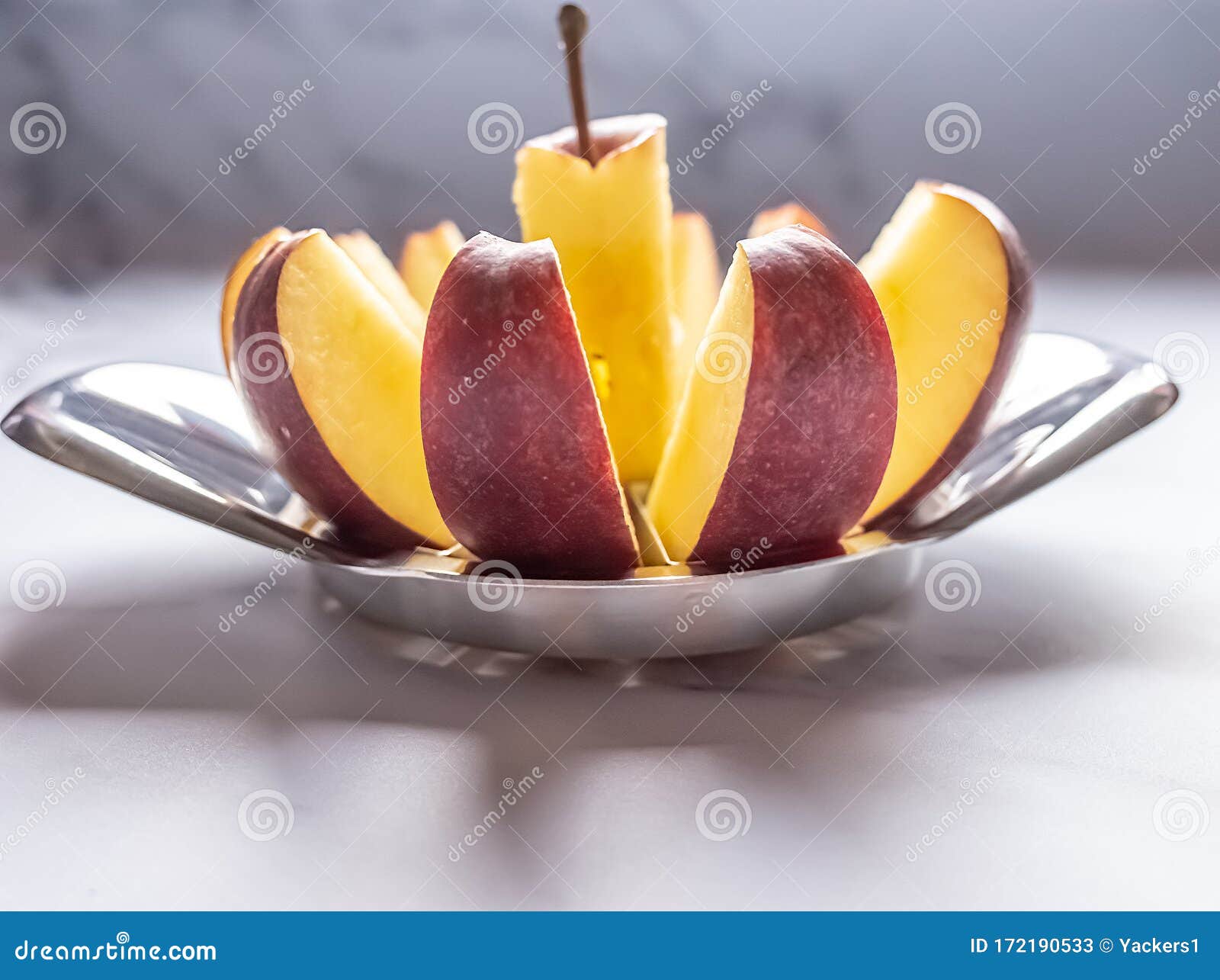 Close Up of Pieces of Red Apple Chopped with a Fruit Blade Stock Image ...
