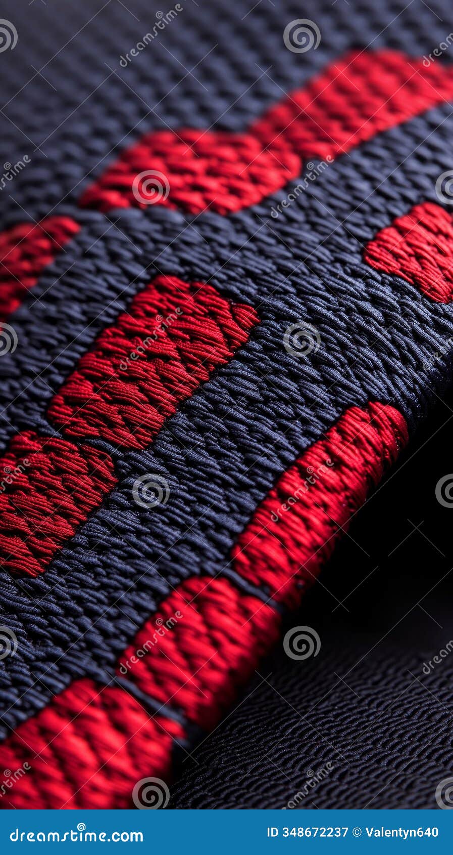 A Close Up of a Red and Black Tie on a Black Surface Stock Image ...