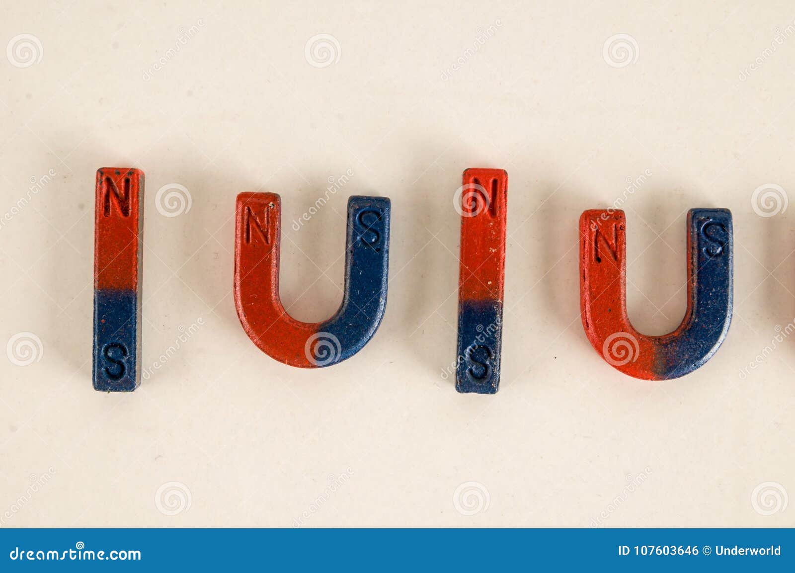 Close-up of Red and Blue Magnet Stock Photo - Image of white, blue ...