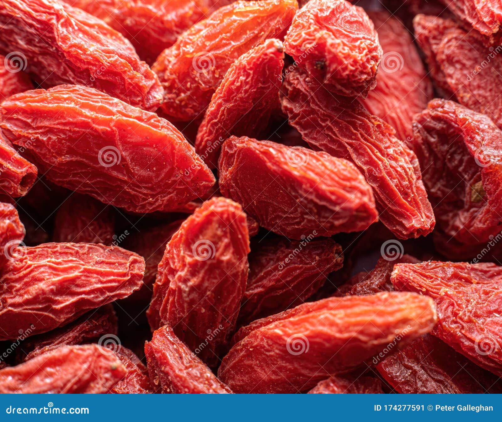 Close Up of Red Goji Berries in a Pile Stock Image - Image of blue ...