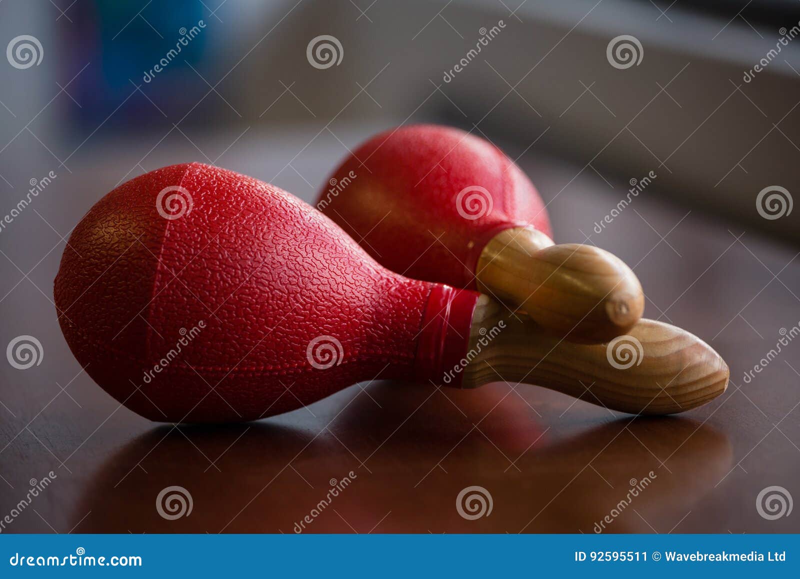 Close Up of Red Maracas on Table Stock Image - Image of foreground ...