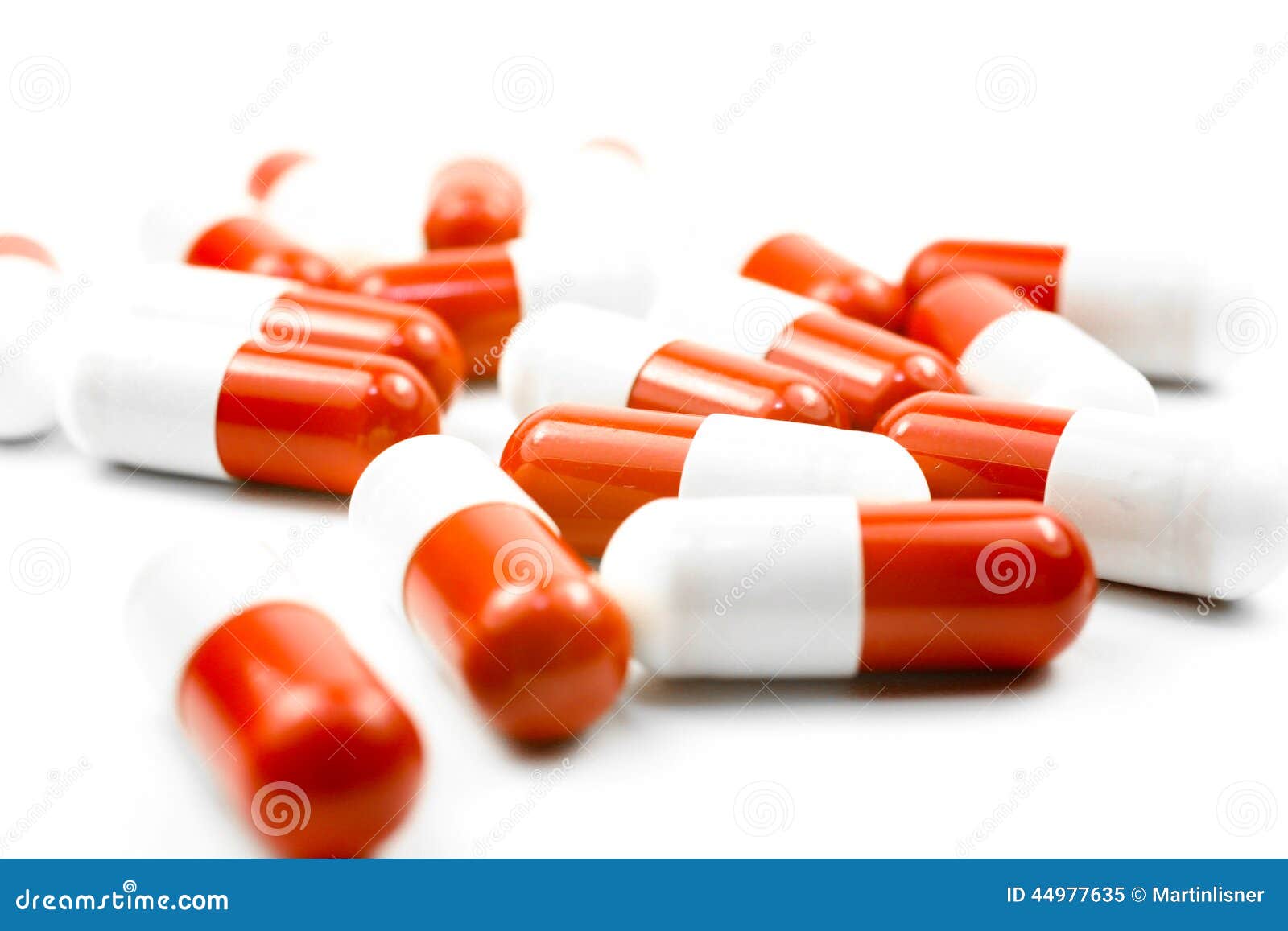 Close Up of Red Medical Capsules on White Background Stock Image ...