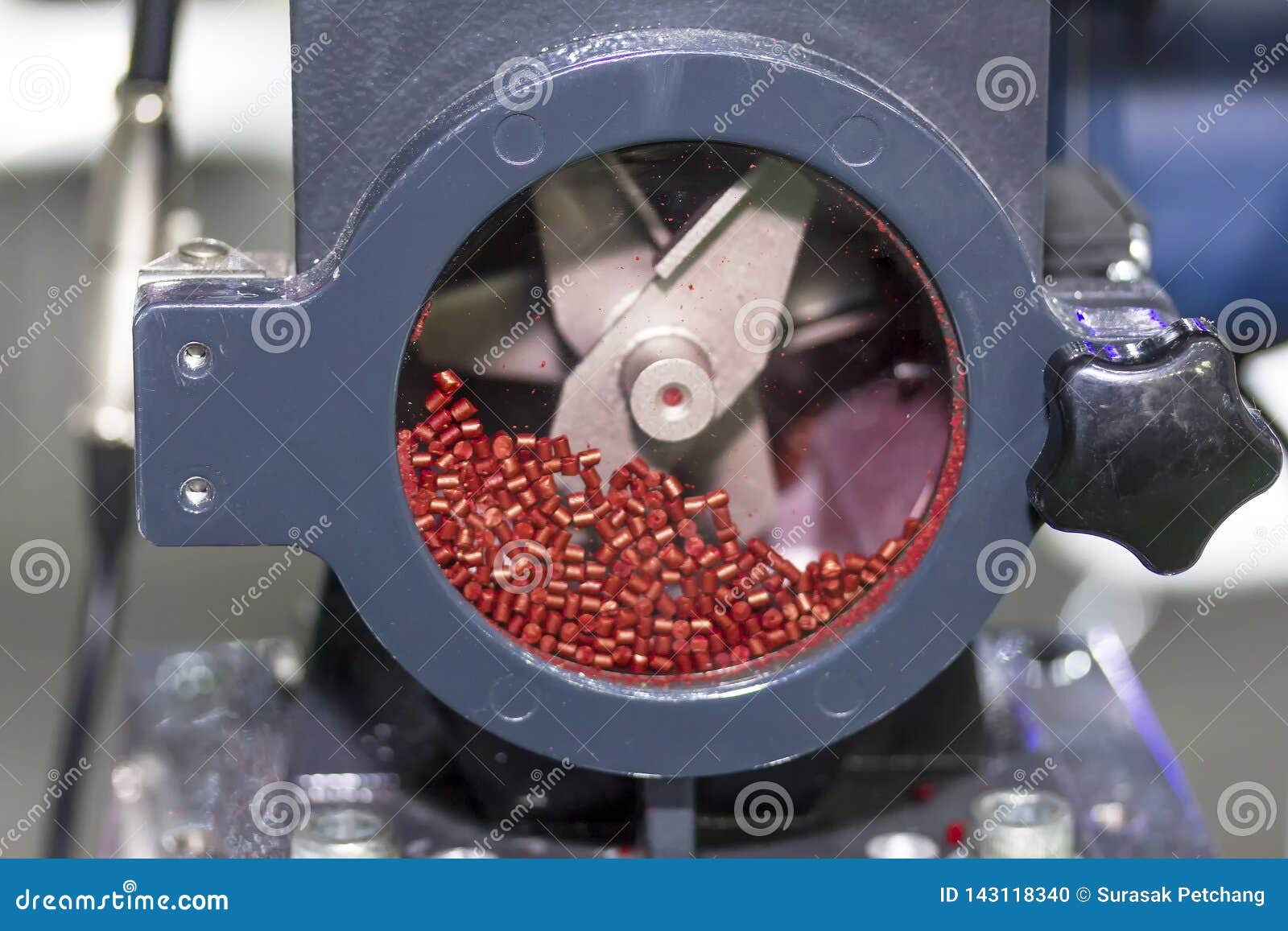 Close Up Red Plastic Granules in Crusher Machine with Blade of Cutting ...