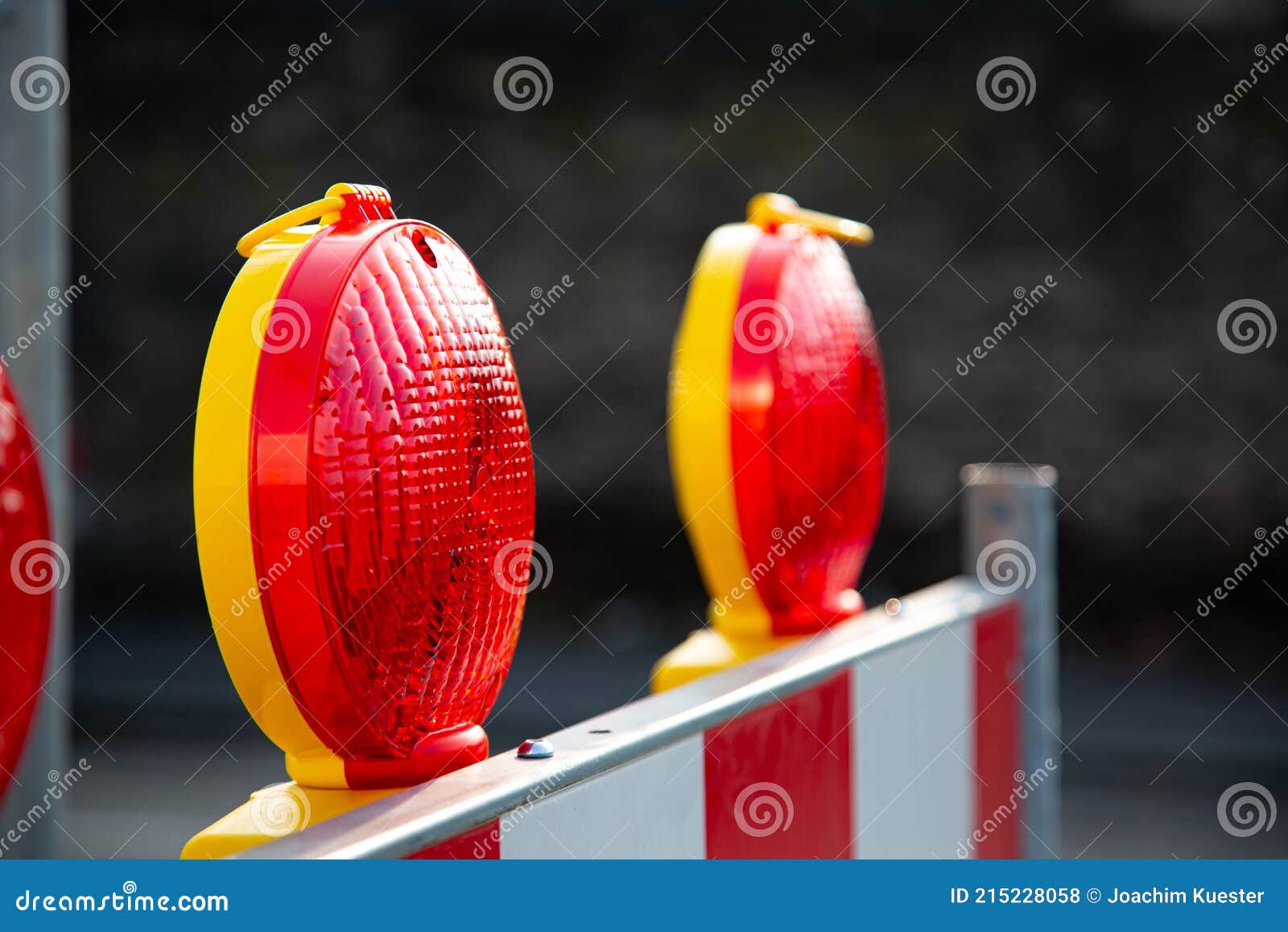 Close-up of Red Warning Lights with Street Barriers at a Construction ...
