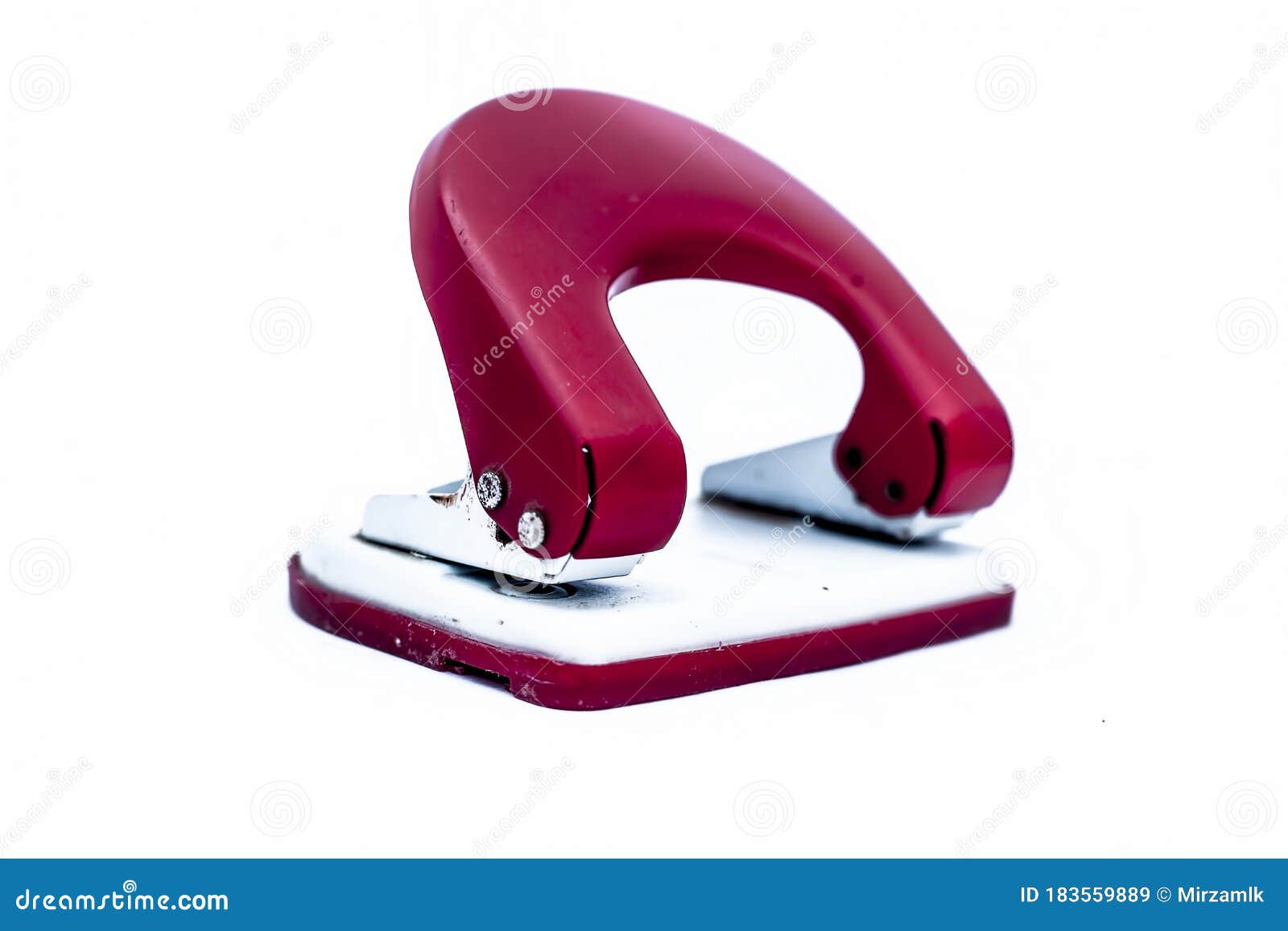 Close Up of Red and White Colored Paper Punching Machine Isolated on ...