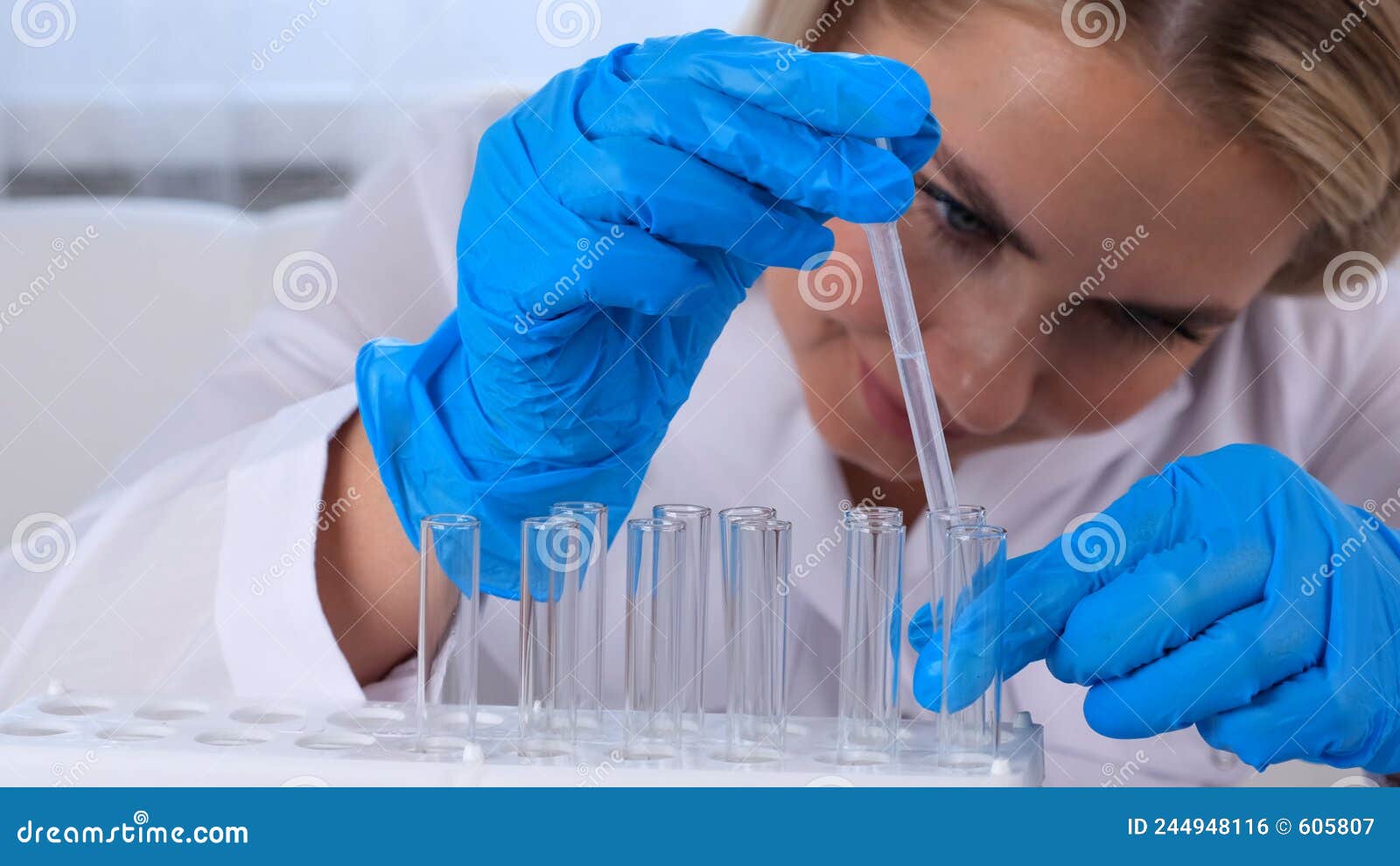 Close Up Research Chemist Takes Samples for Research and Works in a ...