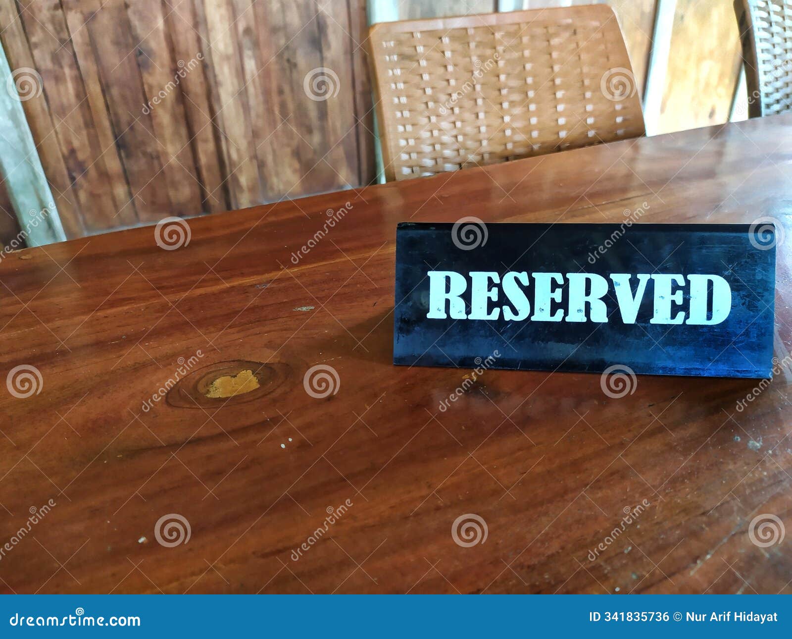 Close-up on a Reserved Sign on a Table at a Restaurant Stock Photo ...
