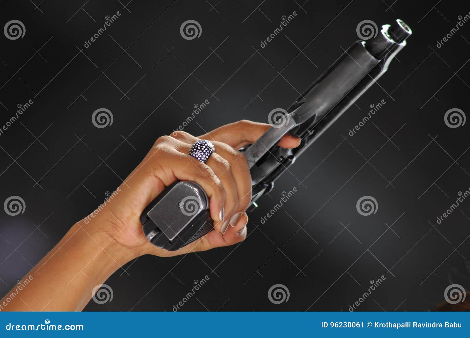 Close up of the revolver stock image. Image of color - 96230061