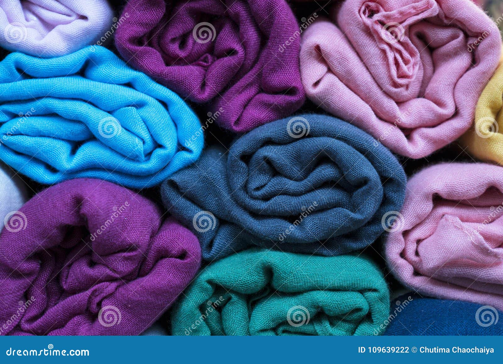 Close up of rolled clothes stock photo. Image of baggage - 109639222