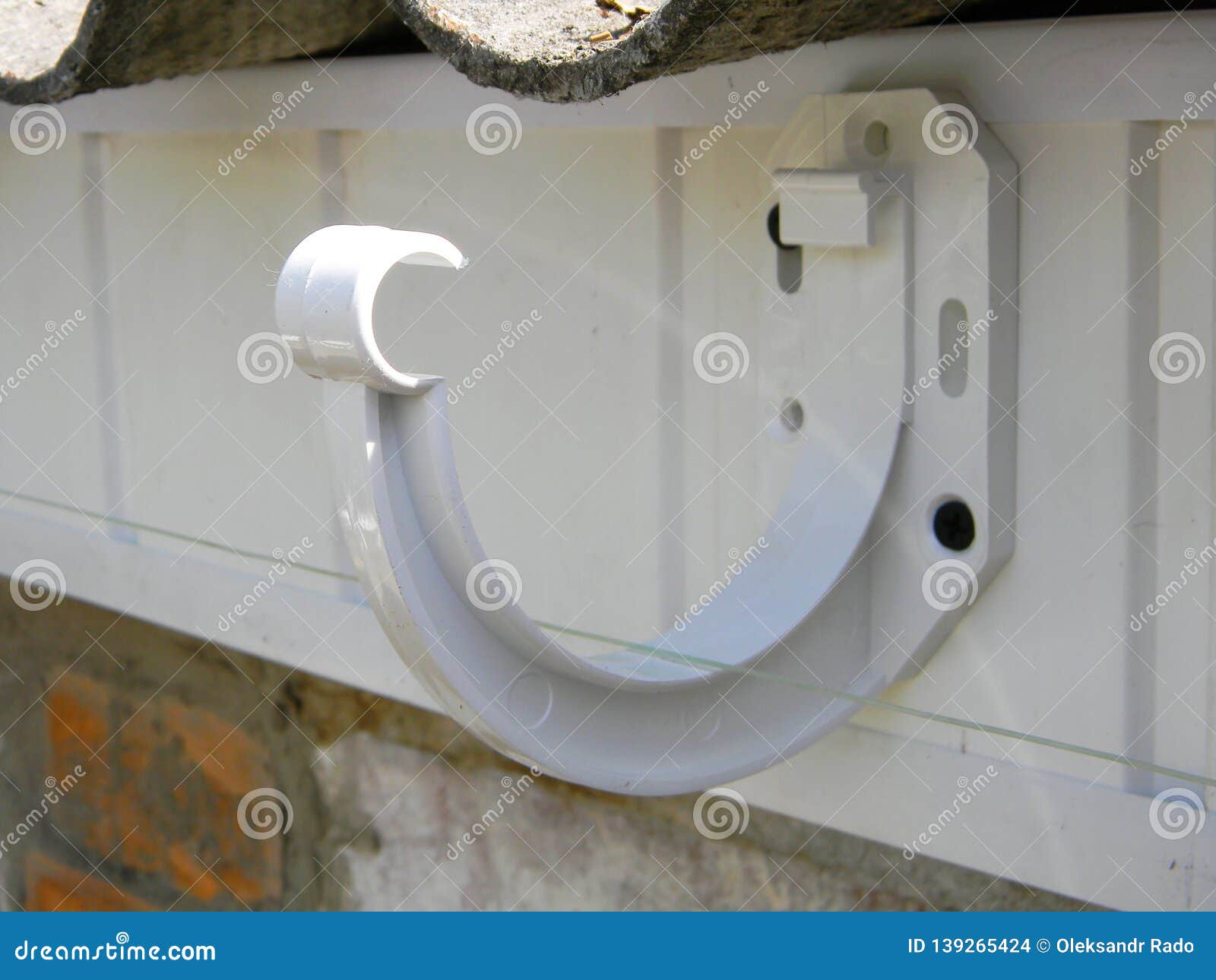 Close Up on Roof Gutter Holder Installation Stock Photo - Image of ...