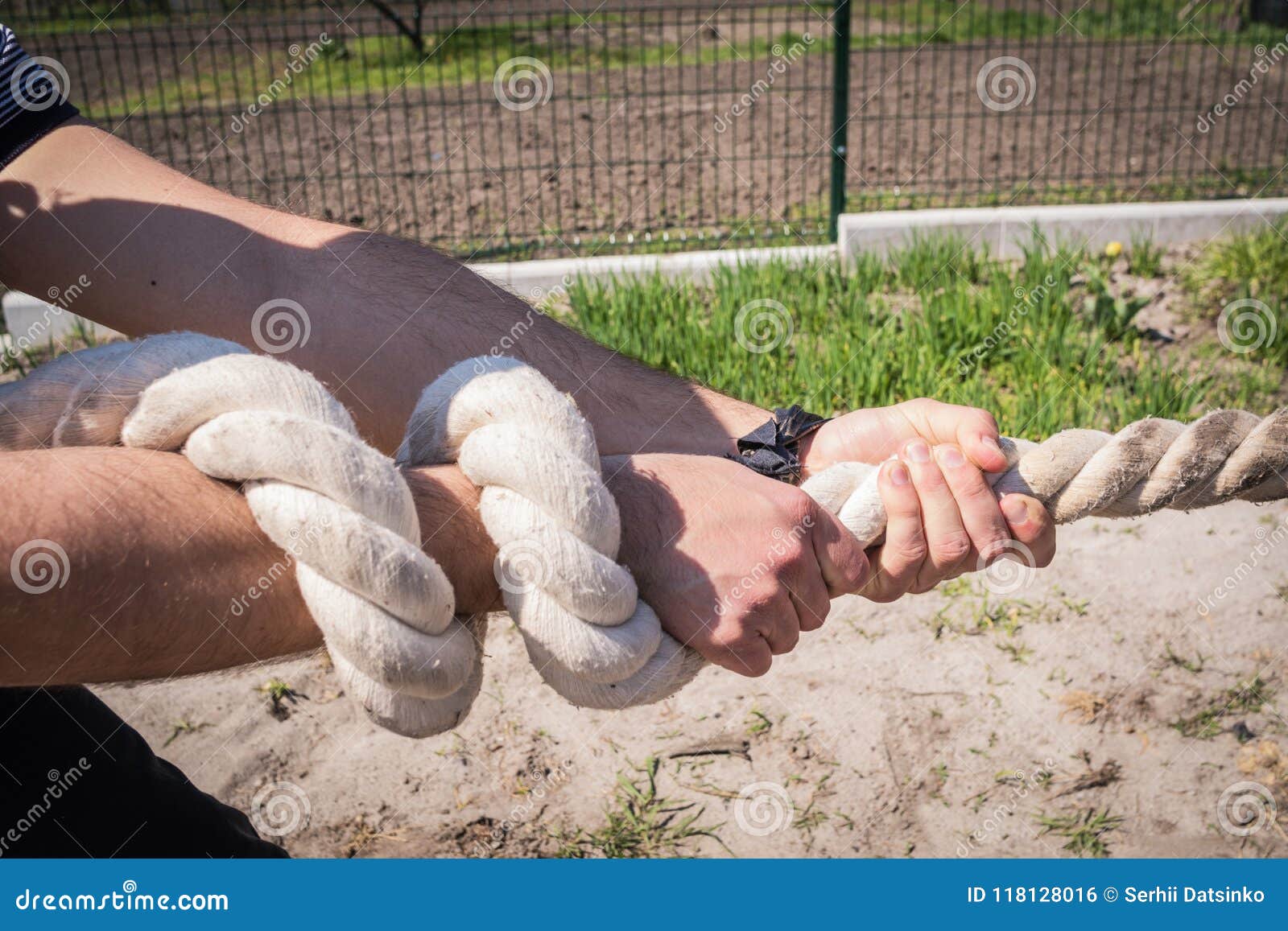 Close-up Rope in Hands of Man, Play Tug of War in Outdoors Stock Photo ...