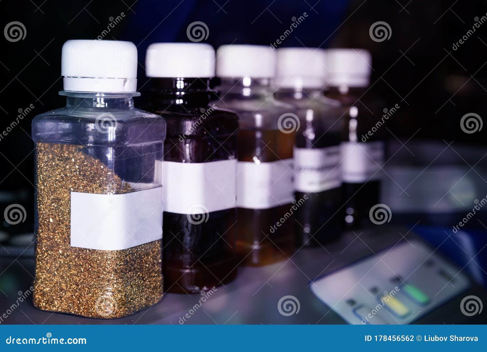 Close-up of a Row of Glass Vials with Samples for Scientific ...